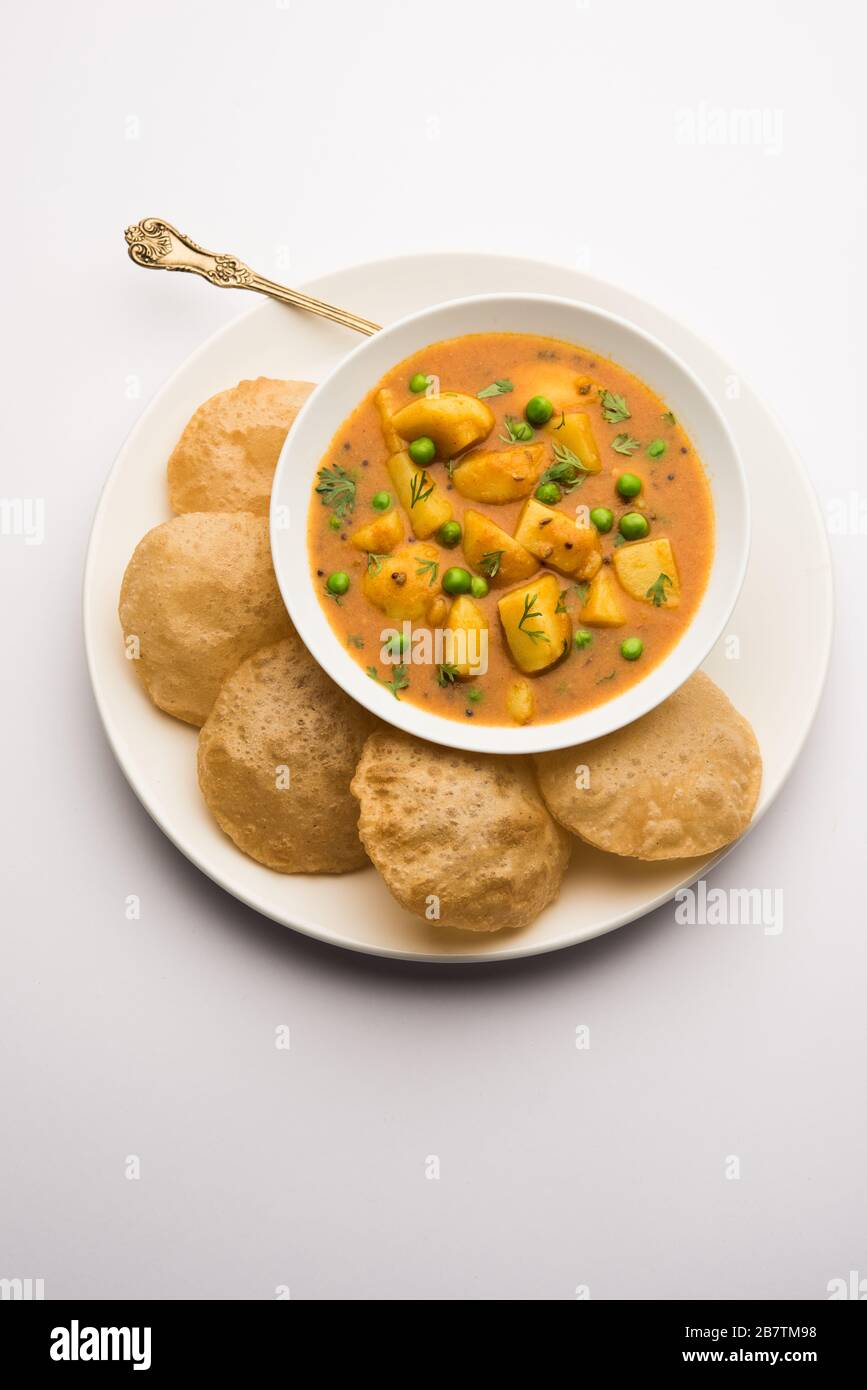 Aloo Puri or Potato curry with fried Poori, popular Indian breakfast ...