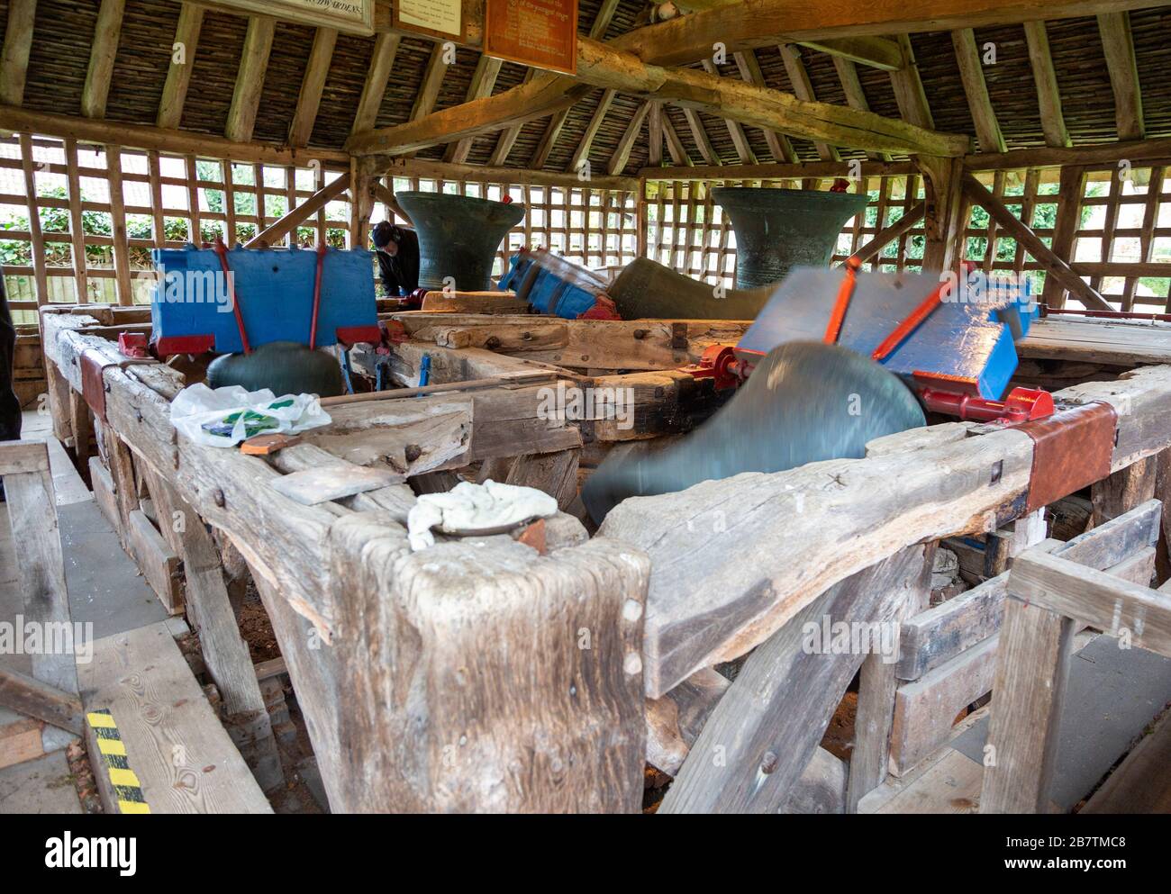 Bells ringing in bell cage of East Bergholt church, Suffolk, England ...
