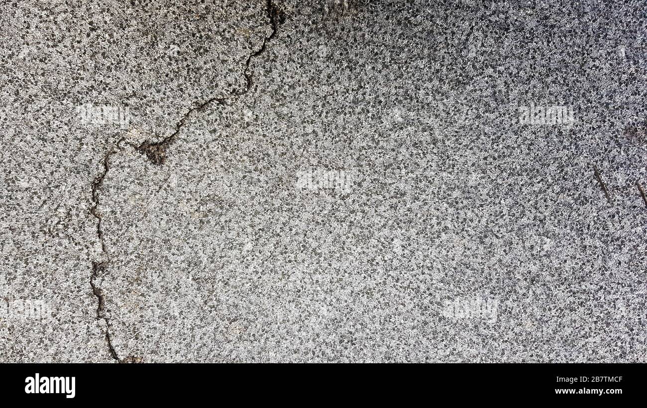 stone texture or background. Coarse cracked stone structure of the face ...