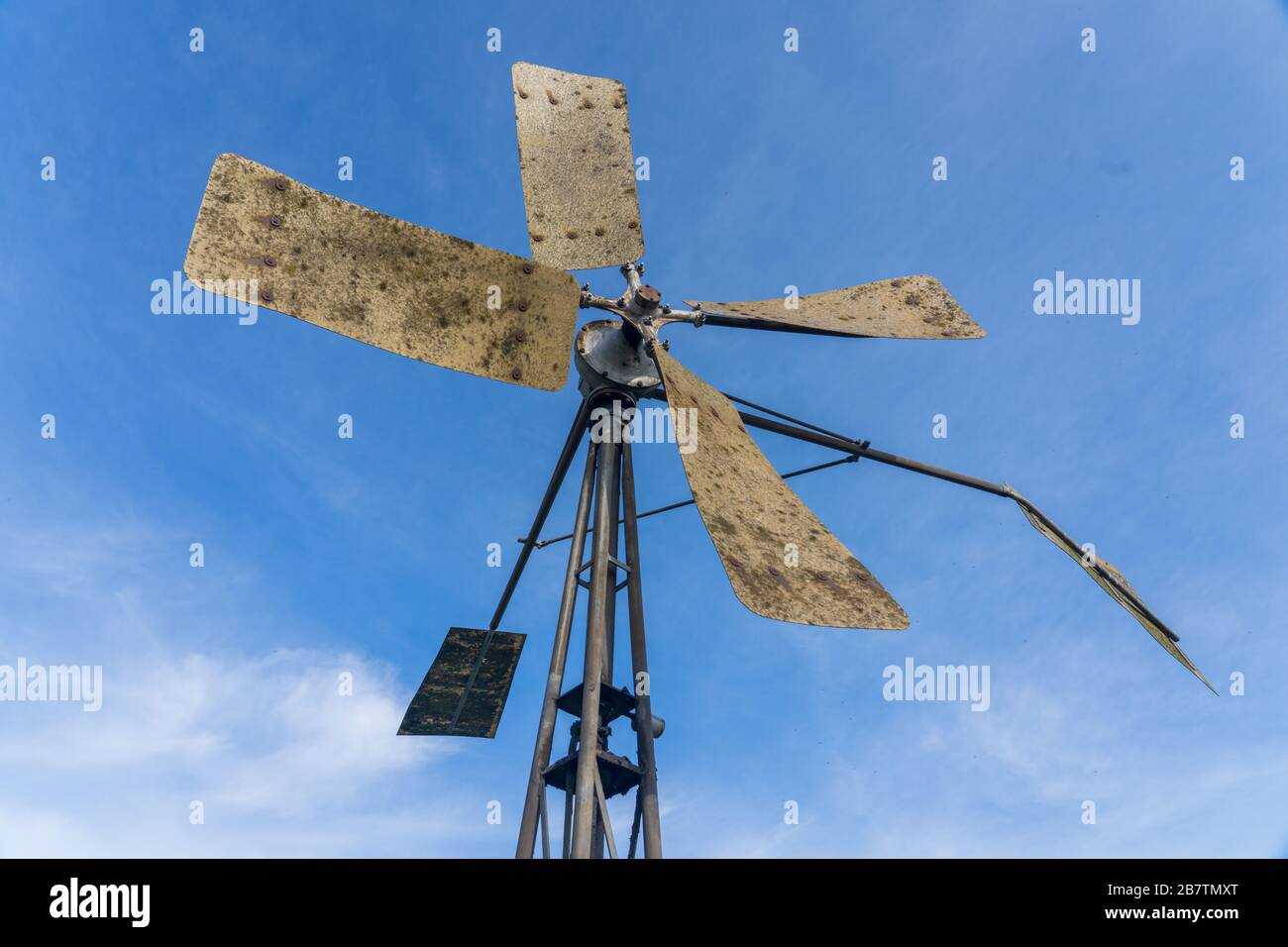 Old windmill with rusty blades Stock Photo - Alamy