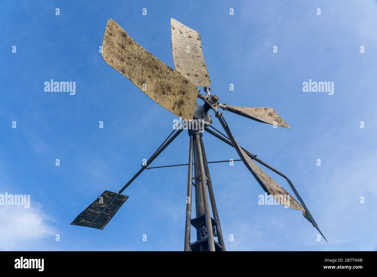 Old windmill with rusty blades Stock Photo - Alamy