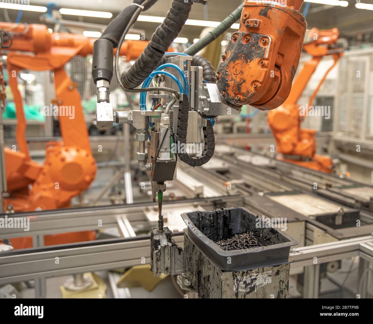 Automatic robotic arm in factory replaces human labor. Automation of ...