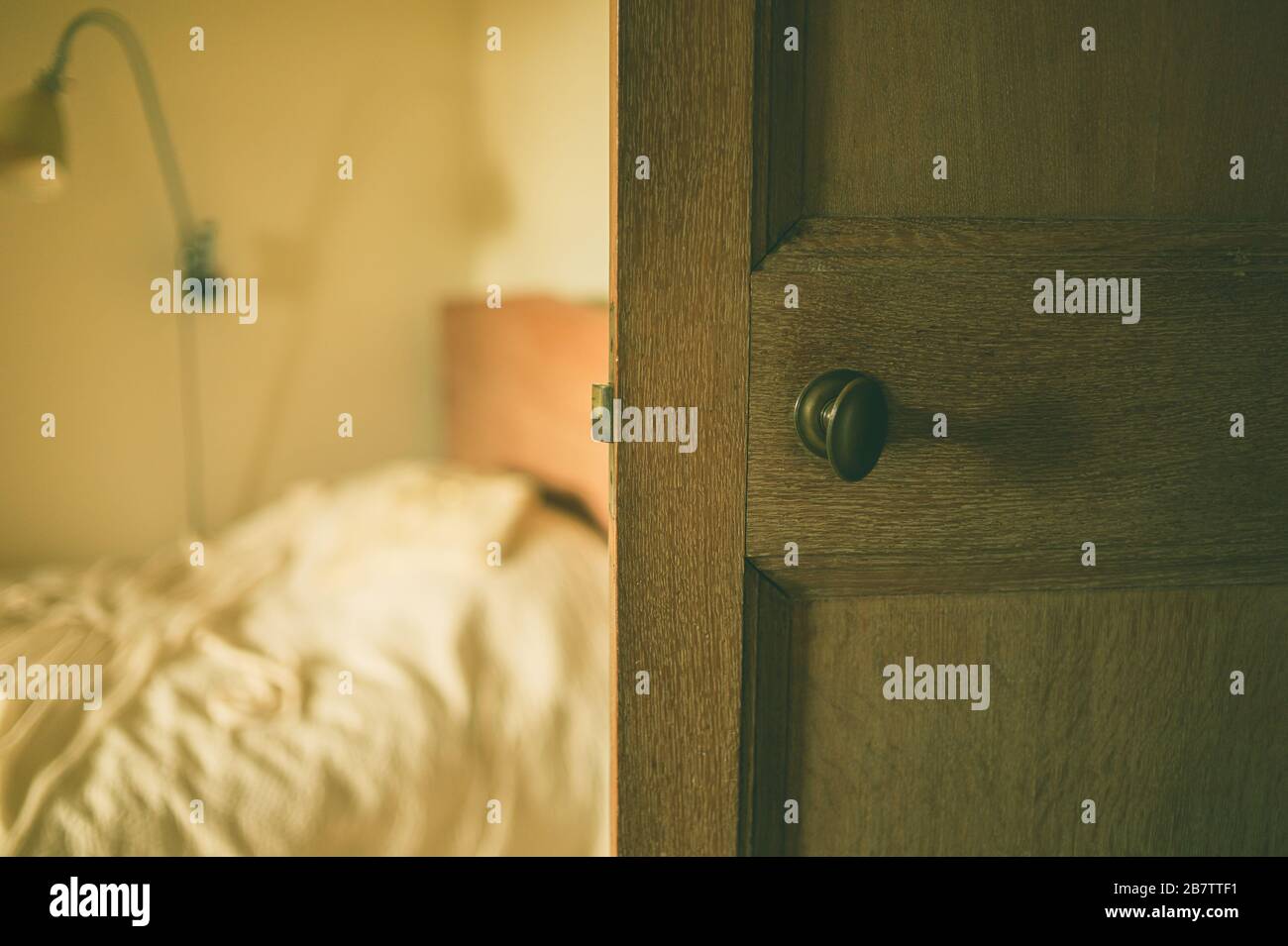 An open door to a bedroom Stock Photo - Alamy