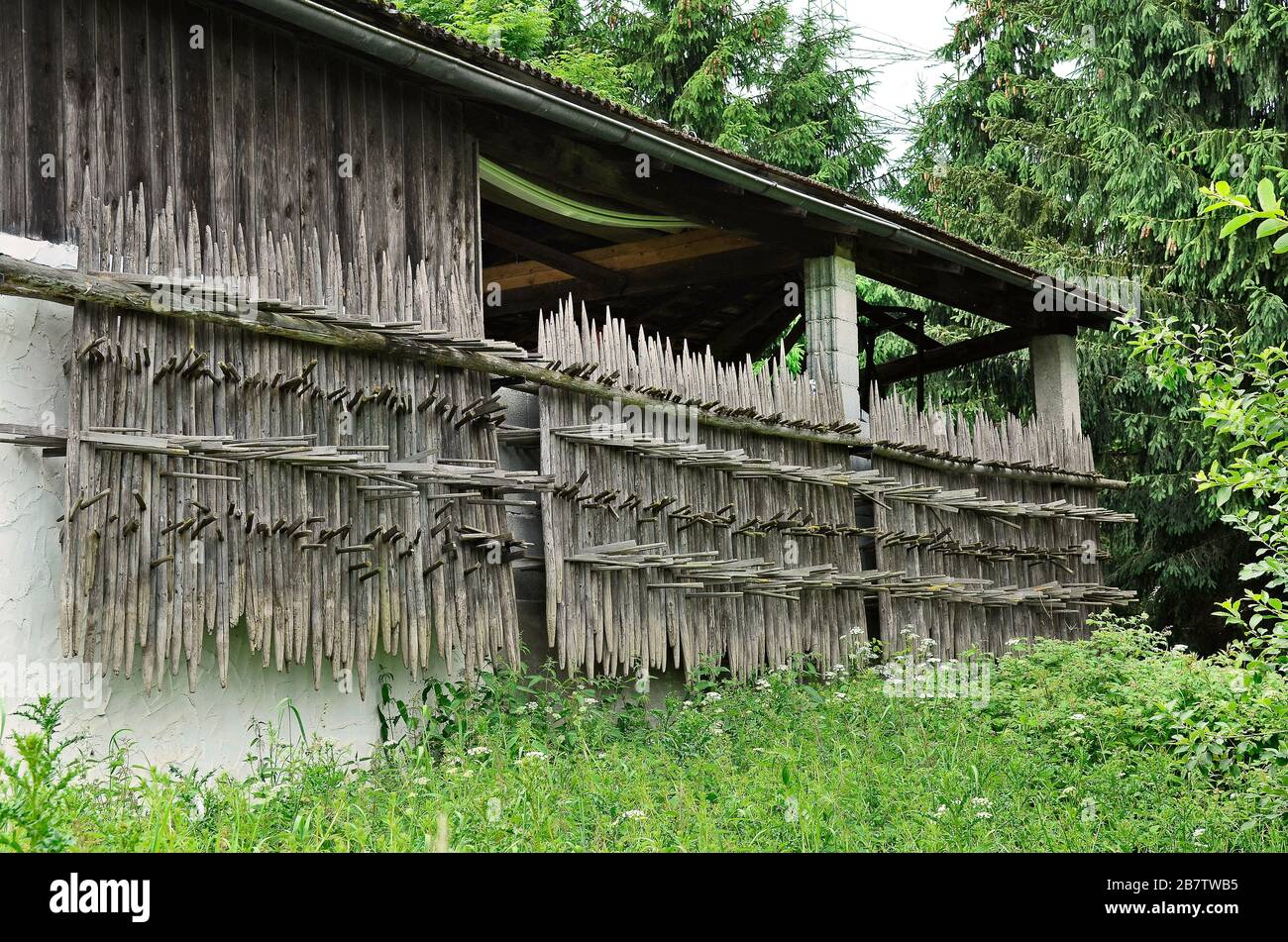 Austria, Tyrol, barn with agricultural equipment Stock Photo - Alamy