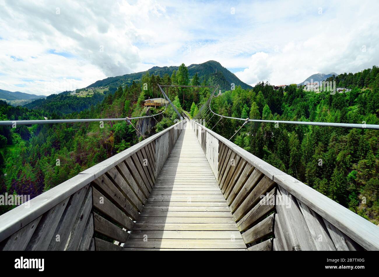 Austria, Tyrol, supension bridge named Benni-Raich-Bridge over canyon ...