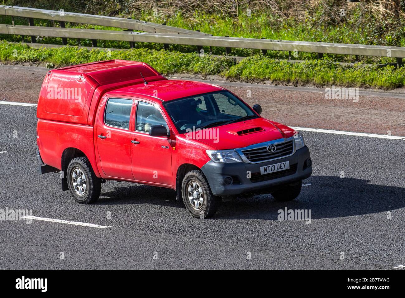 2013 red Toyota Hilux HL2 D-4d 4X4 DCB; UK vehicular traffic, transport ...