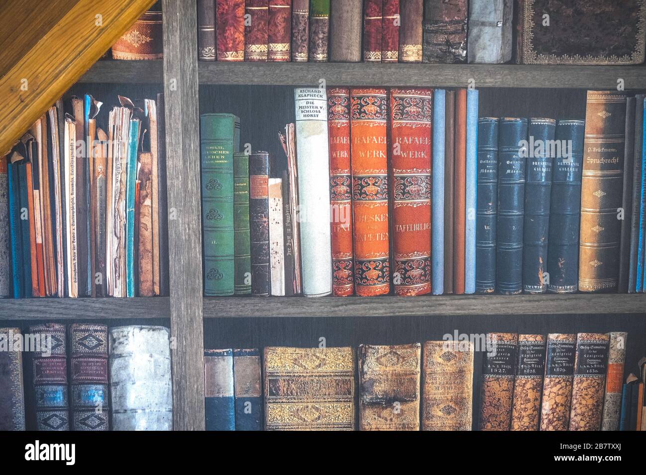 Close up wallpaper of antique books Stock Photo - Alamy