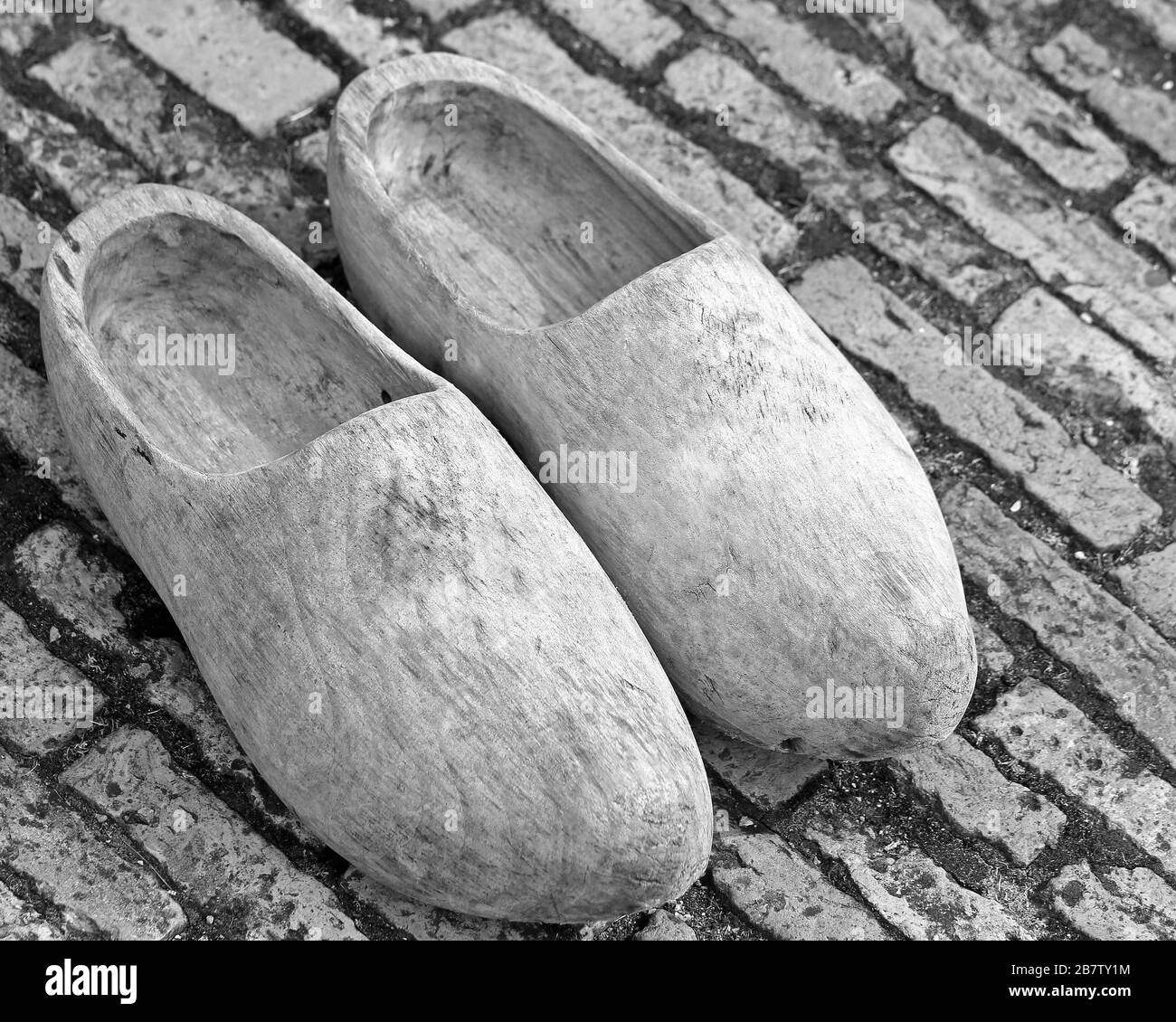Dutch clogs made in rough wood with black and white effect Stock Photo ...