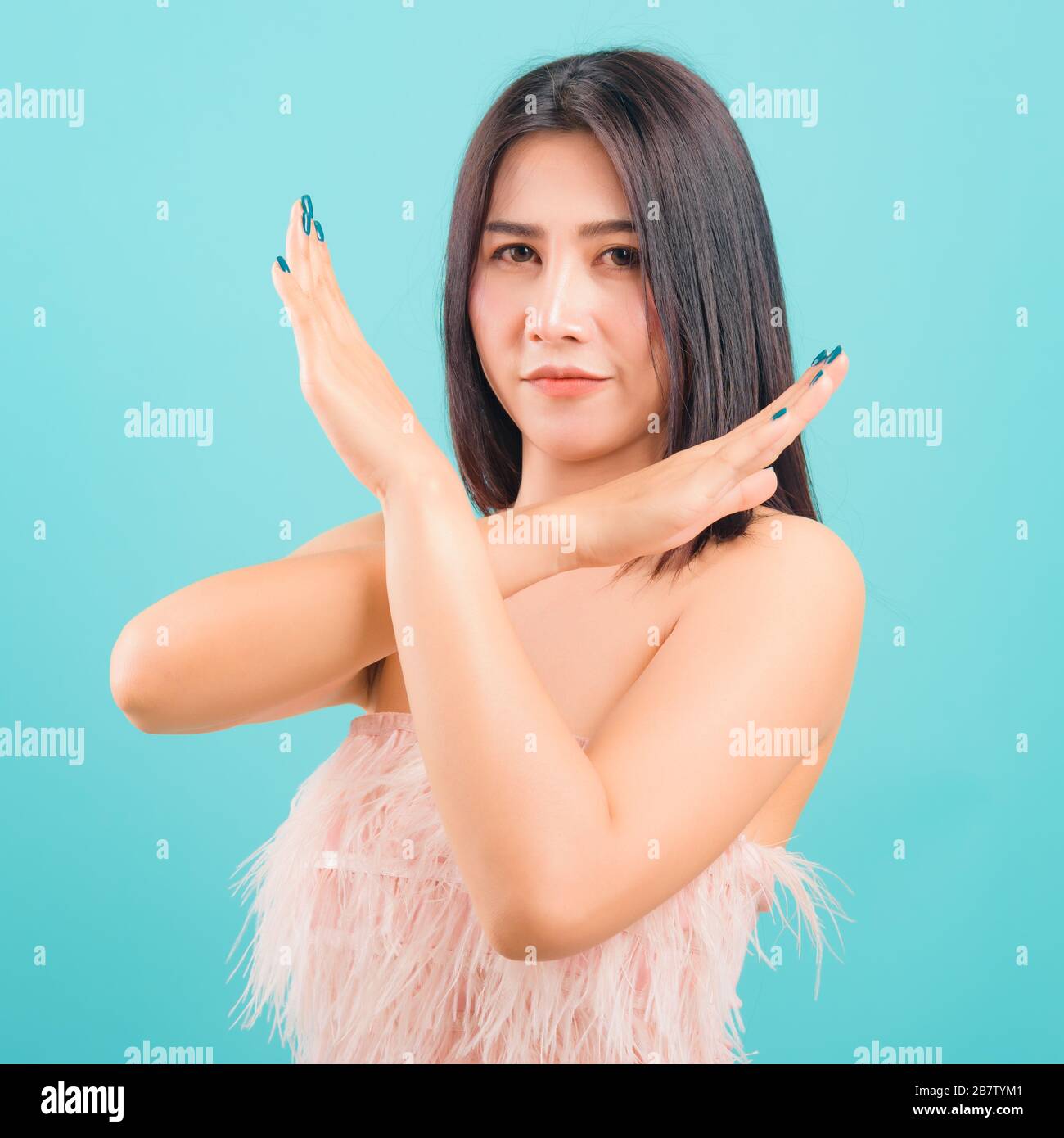 Asian beautiful woman her showing say no hand sign looking to camera on ...