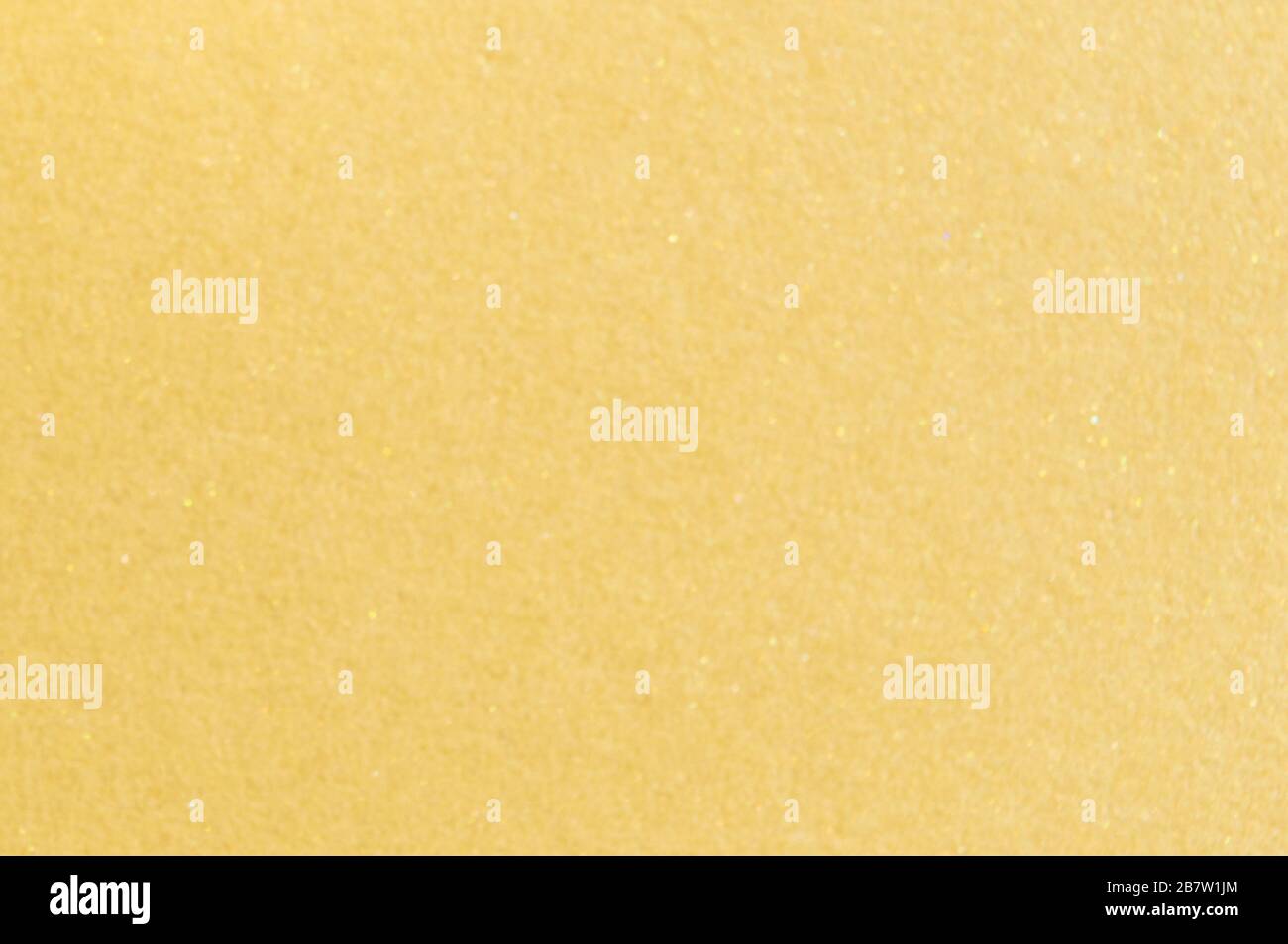 Light yellow background with little sparkling details Stock Photo - Alamy