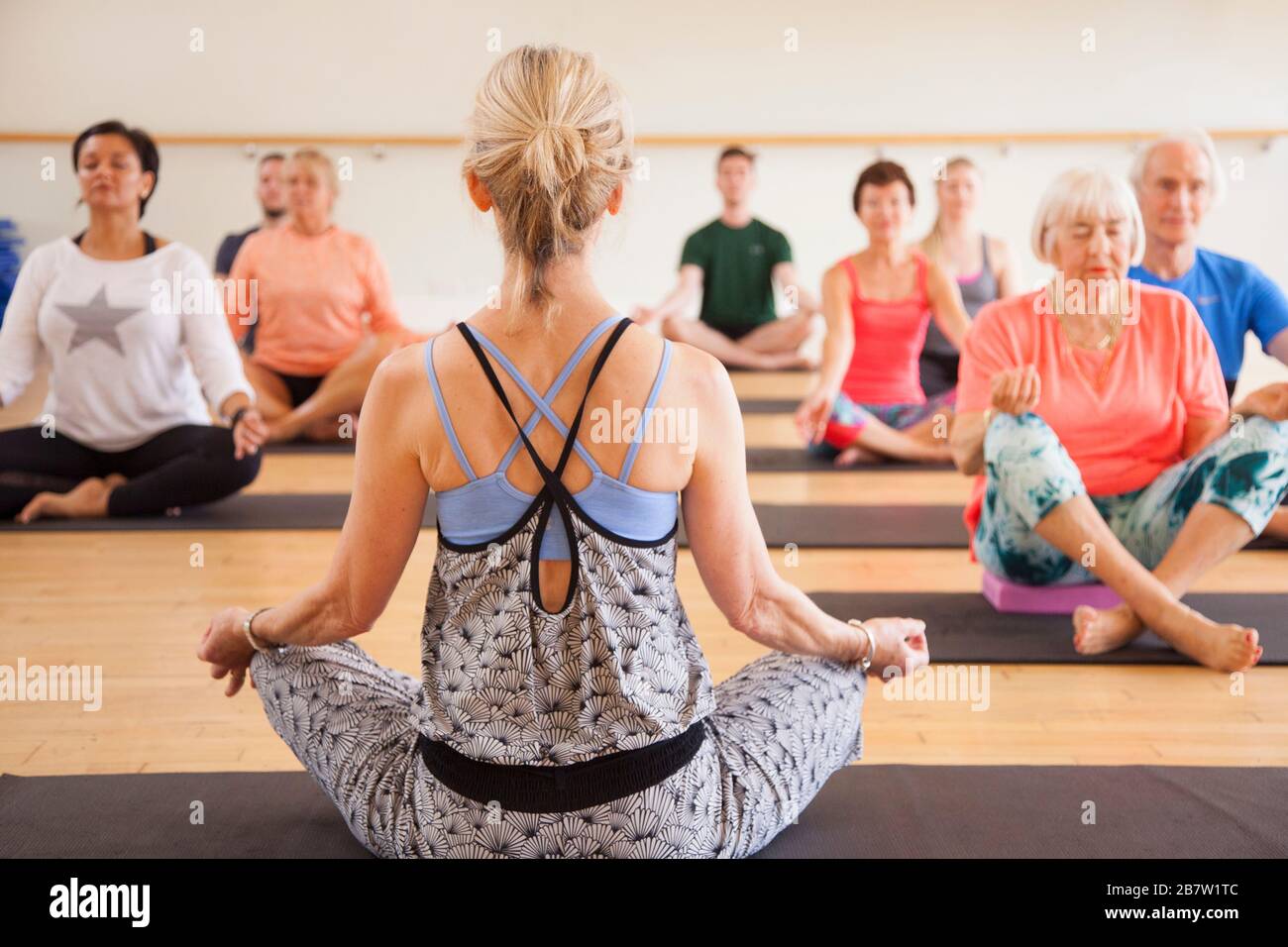 Middle aged woman sitting from behind hi-res stock photography and ...