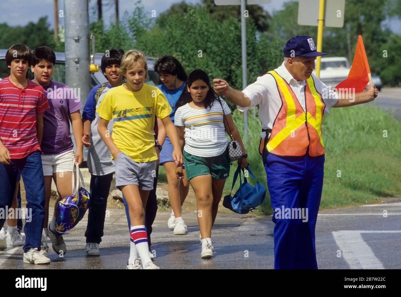 Austin, Texas USA: School crossing guard directing pedestrian and ...