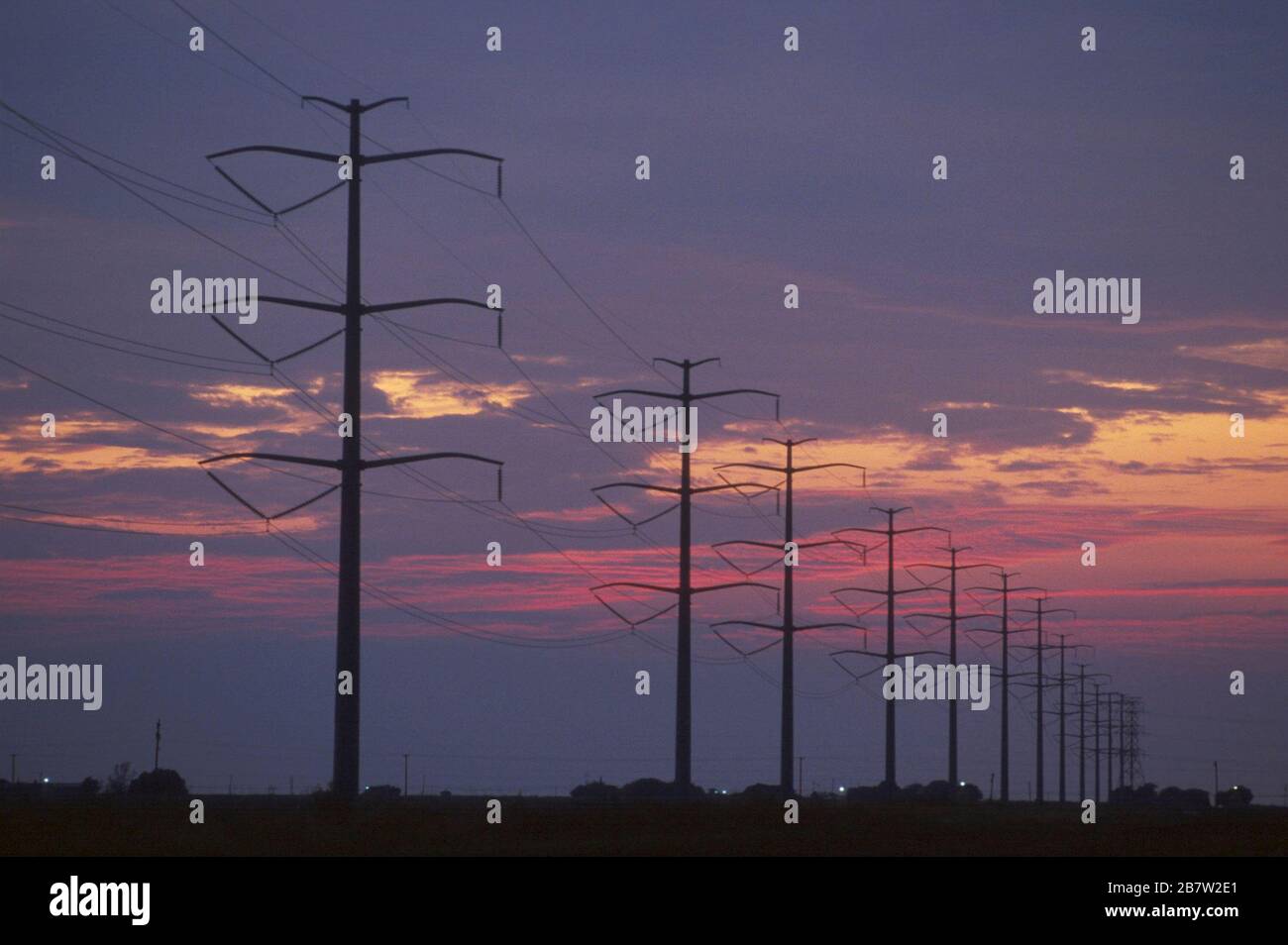 Power lines attached to utility poles in South Texas. ©Bob Daemmrich ...