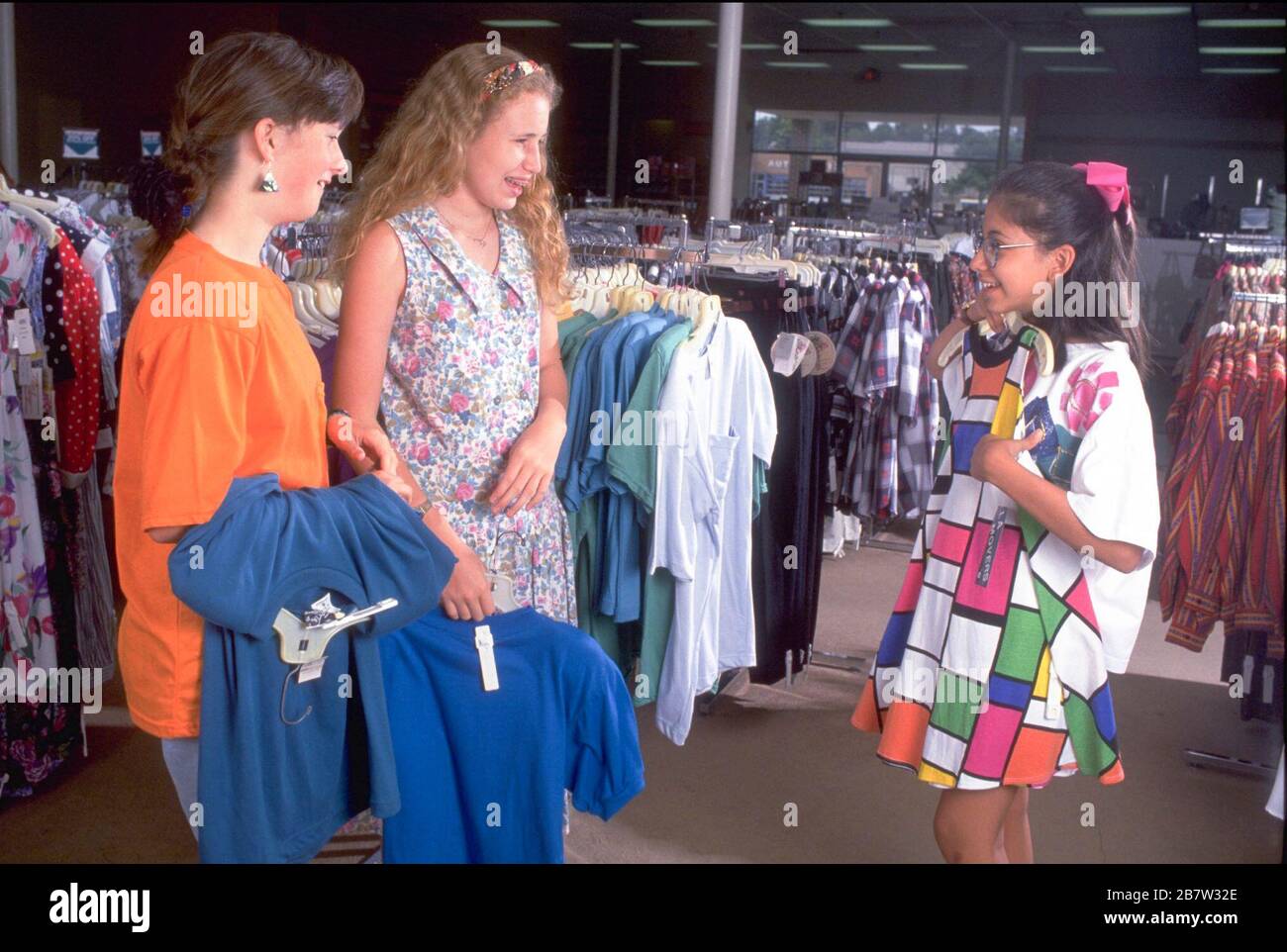 Austin Texas USA: Teen girls shopping together for clothes at ...