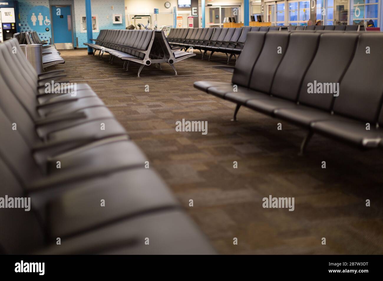 Colour landscape photograph of a passenger waiting lounge inside an ...
