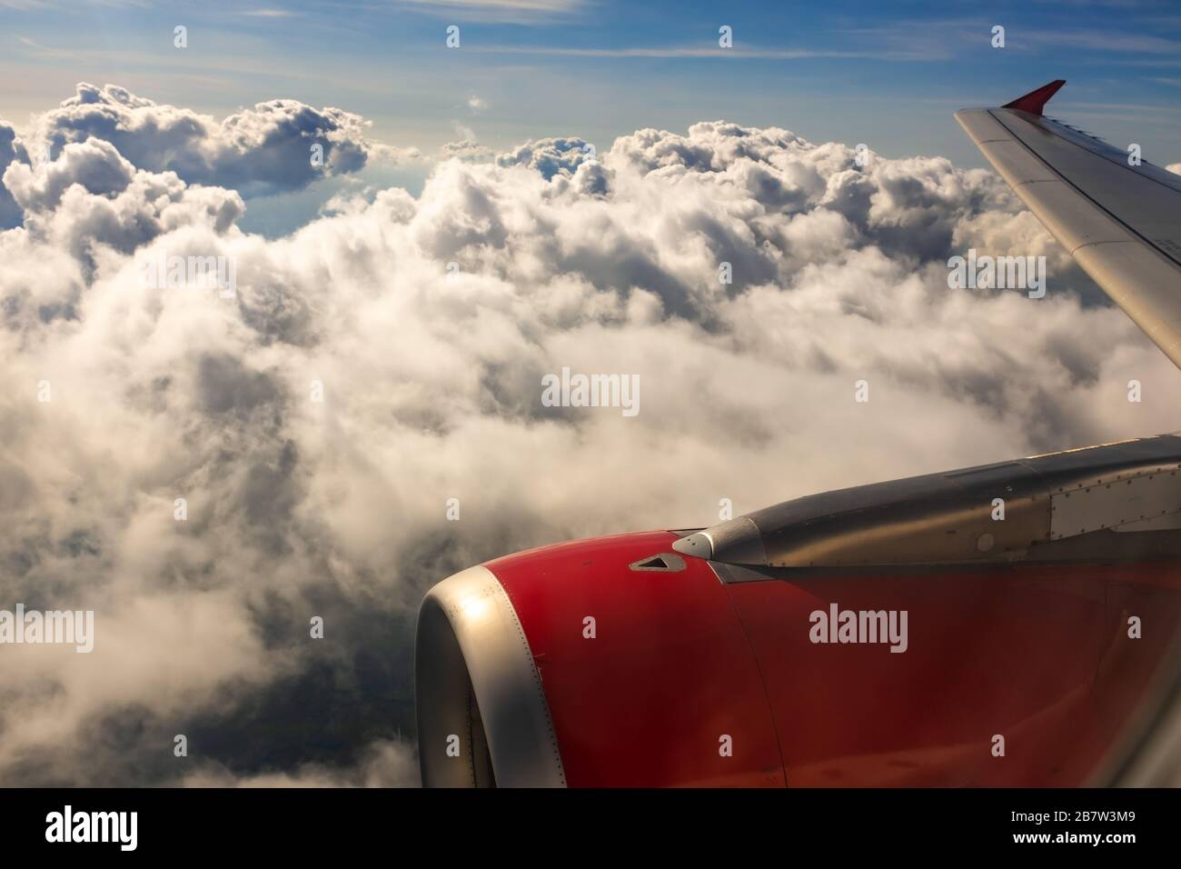 A colour landscape image looking out through airplane window showing ...