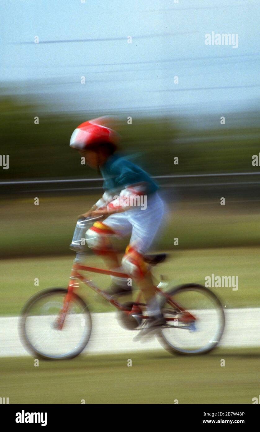 Hispanic fifth grade boy ride on BMX bike. MR ©Bob Daemmrich Stock ...