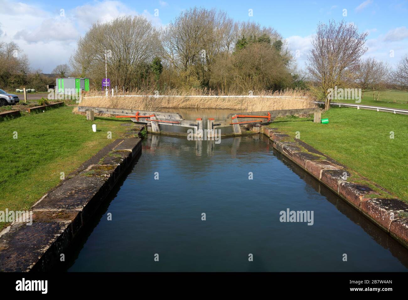 One pair of old wooden lock gates with recently repaired/renewed steel ...