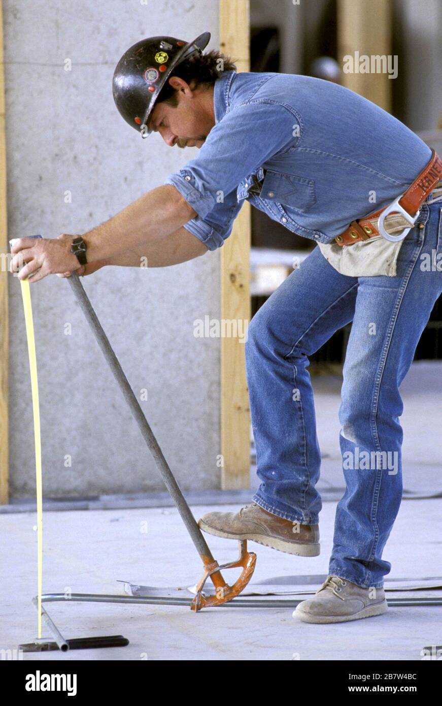 Austin, Texas USA: Construction worker wearing hard hat at work site ...