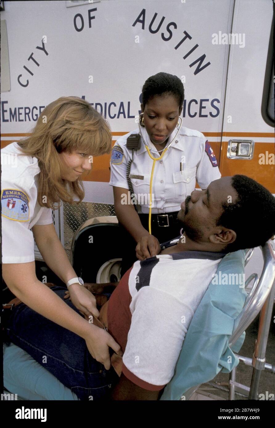 Austin, Texas USA: Female emergency medical technicians attending a ...