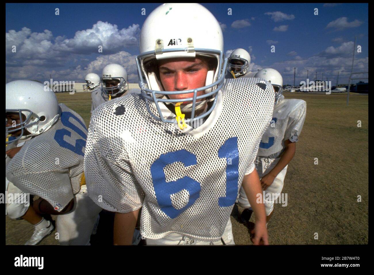 Girl wearing football helmet hi-res stock photography and images - Alamy