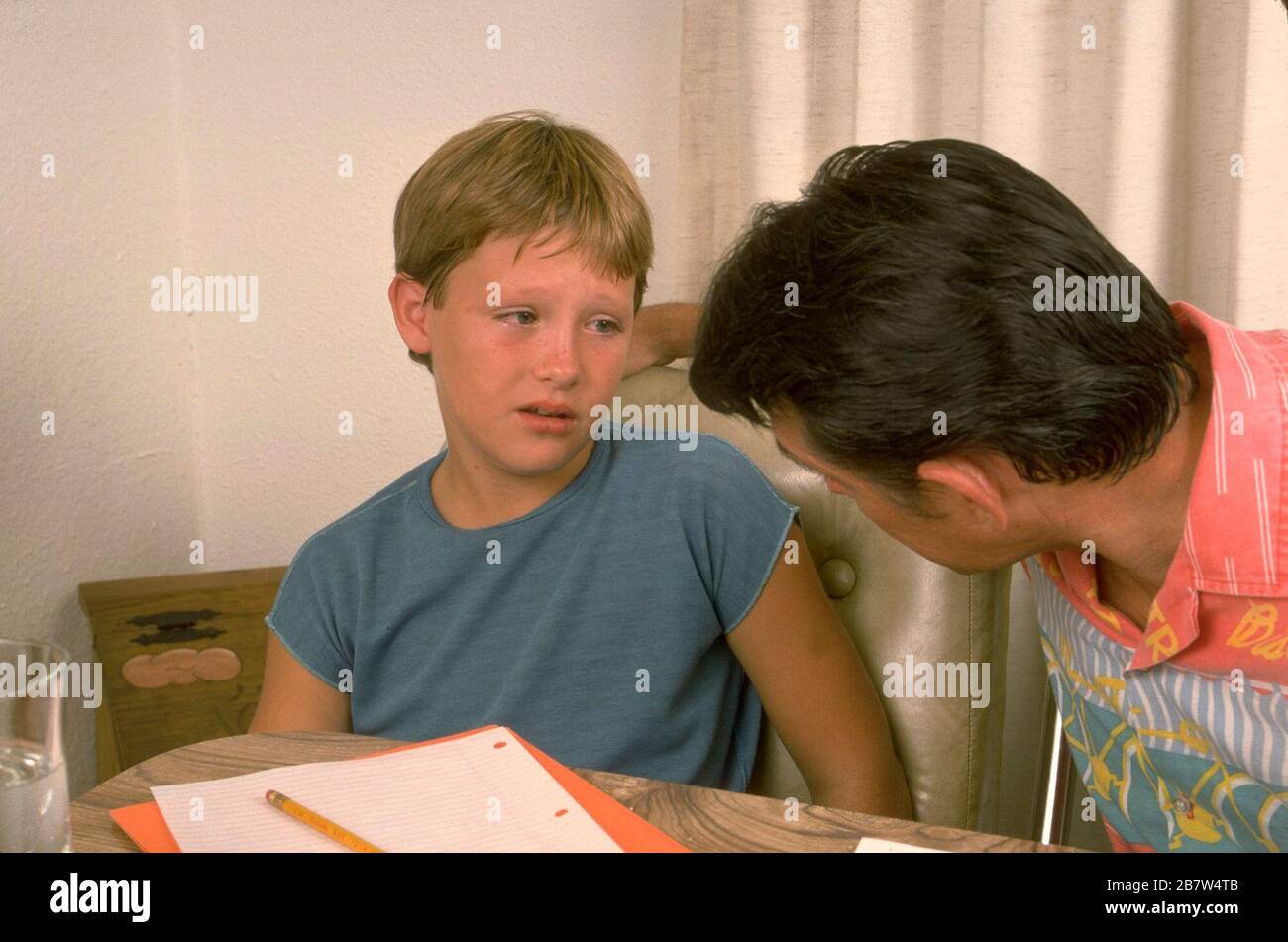 Father expressing concern and affection for 13-year-old son. MR ©Bob ...