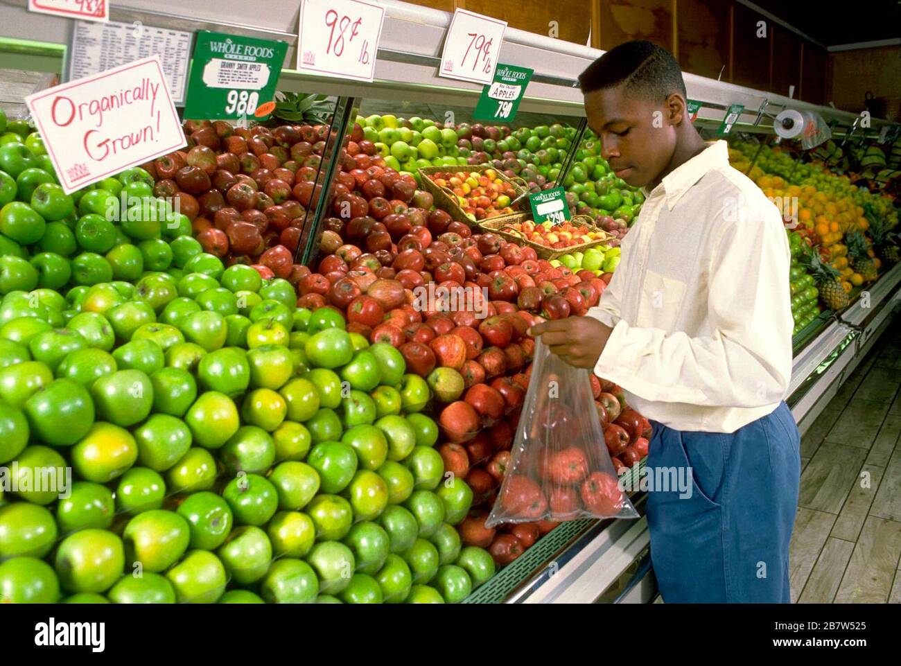 Austin Texas USA: High school teen choosing healthy, organically grown ...