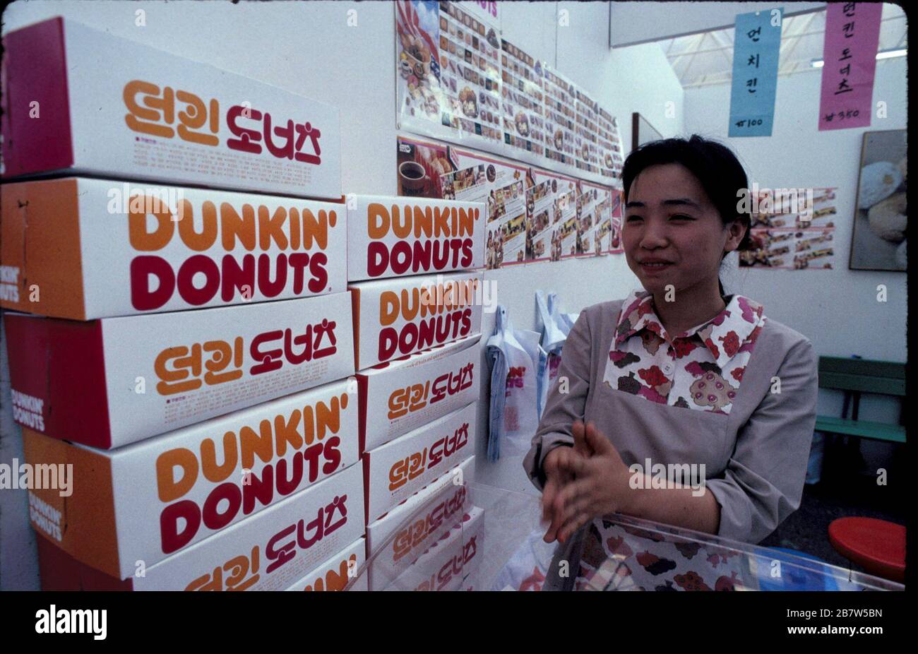 Seoul, Korea, 1988: Woman at counter of Dunkin' Donuts Shop ...