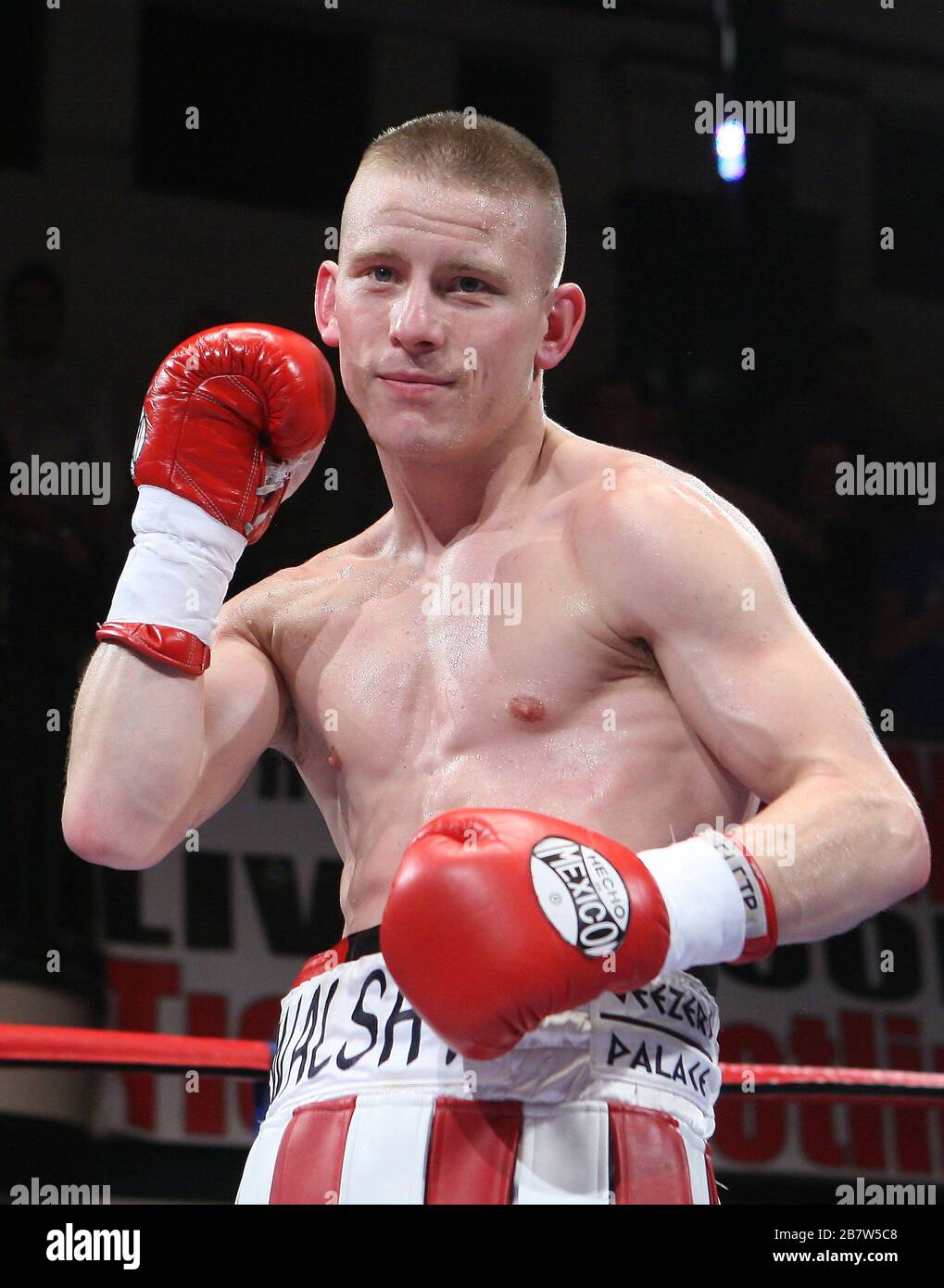 Michael Walsh (red/white shorts) defeats Ian Bailey in a Bantamweight ...