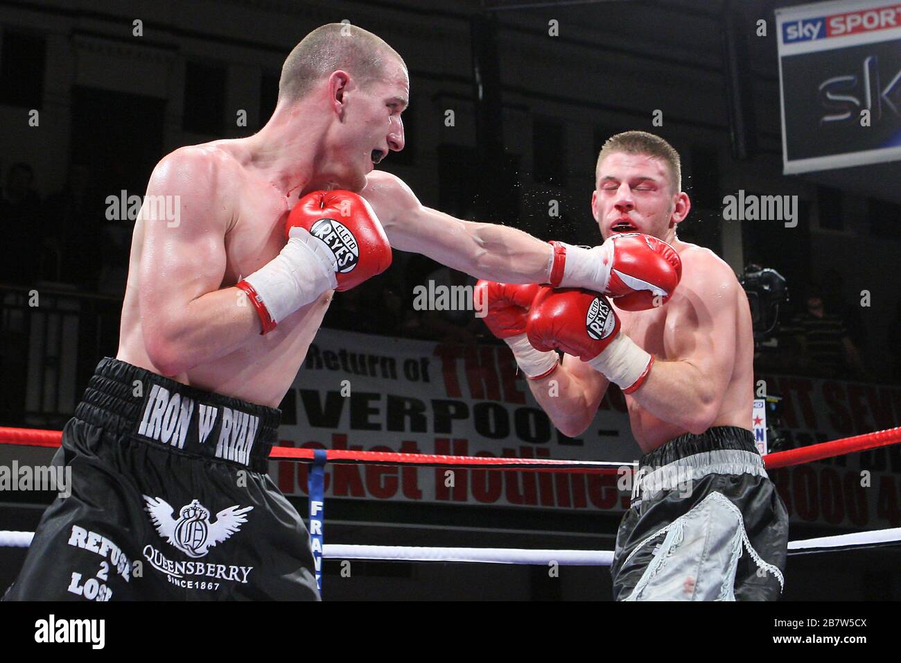Ryan Walsh (black shorts) defeats James Ancliff in a Super-Bantamweight ...