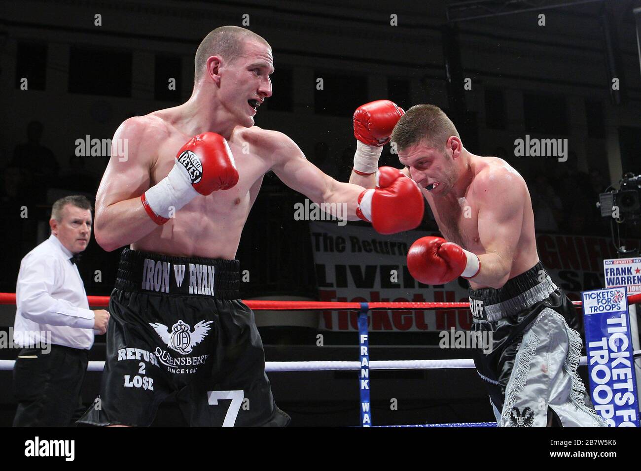 Ryan Walsh (black shorts) defeats James Ancliff in a Super-Bantamweight ...
