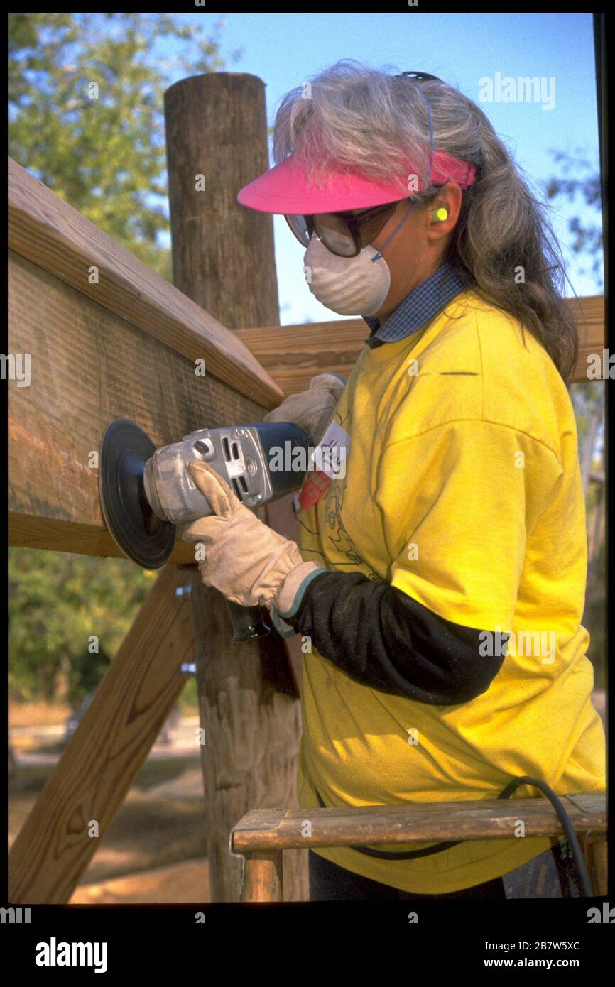 Female electric sander hi-res stock photography and images - Alamy