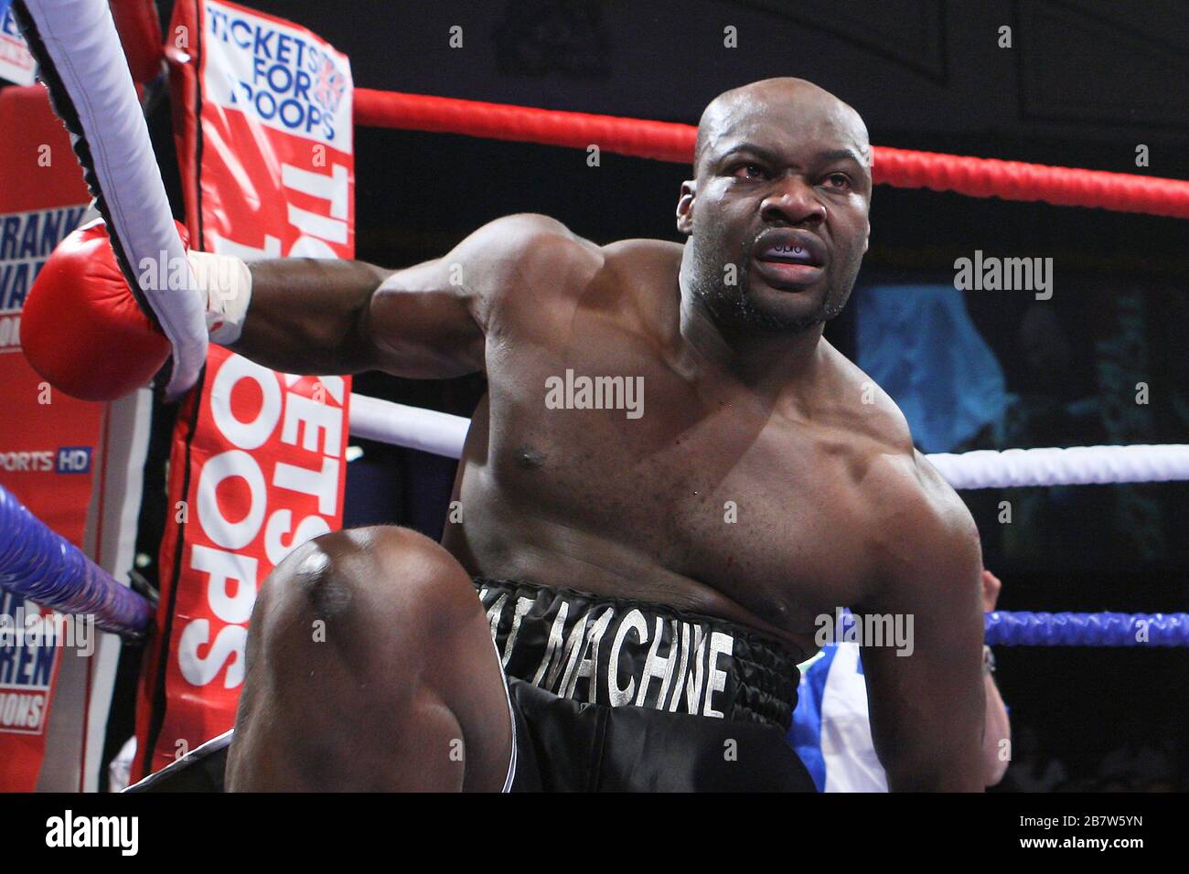 John McDermott (white/blue shorts) defeats Larry Olubamiwo in a ...