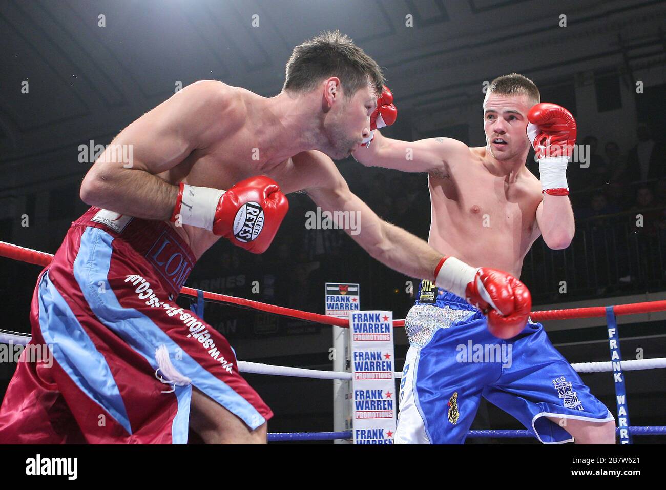 Frankie Gavin (blue shorts) defeats Michael Lomax in a Light ...