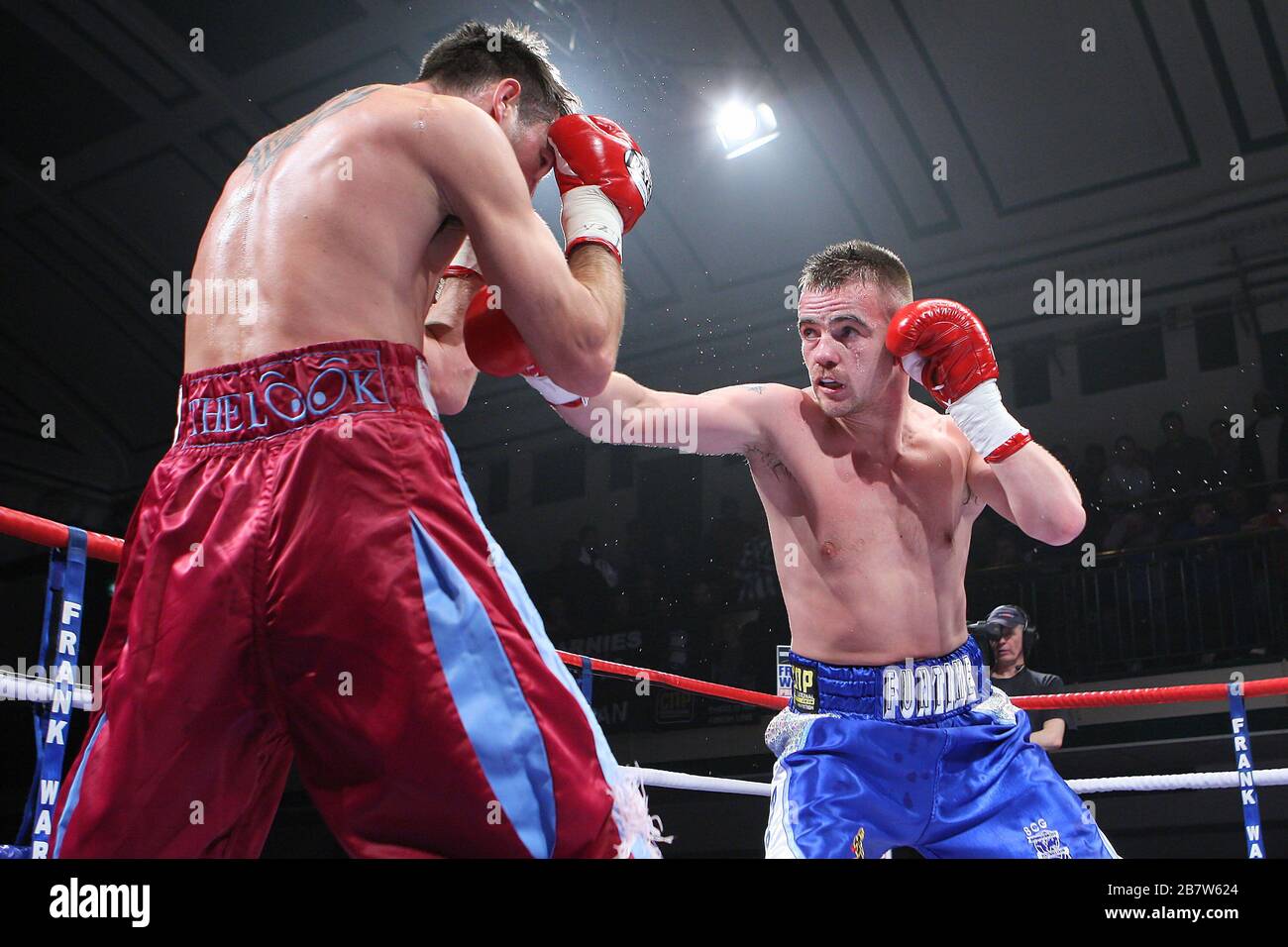 Frankie Gavin (blue shorts) defeats Michael Lomax in a Light ...