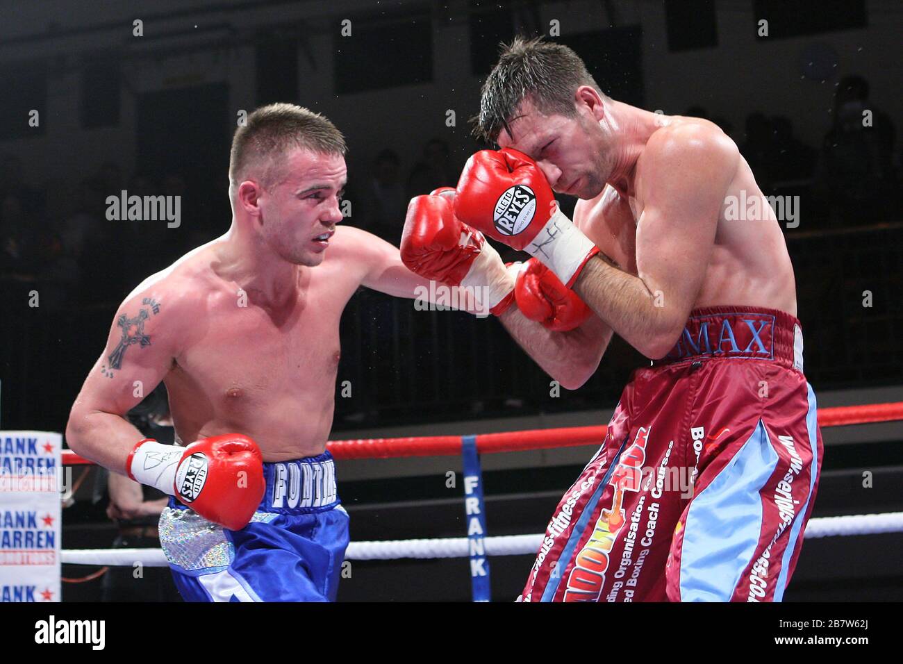 Frankie Gavin (blue shorts) defeats Michael Lomax in a Light ...