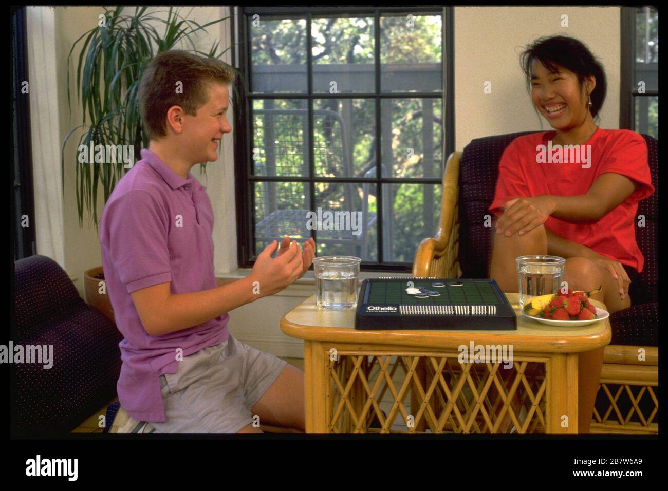 Teenagers having fun playing board hi-res stock photography and images ...