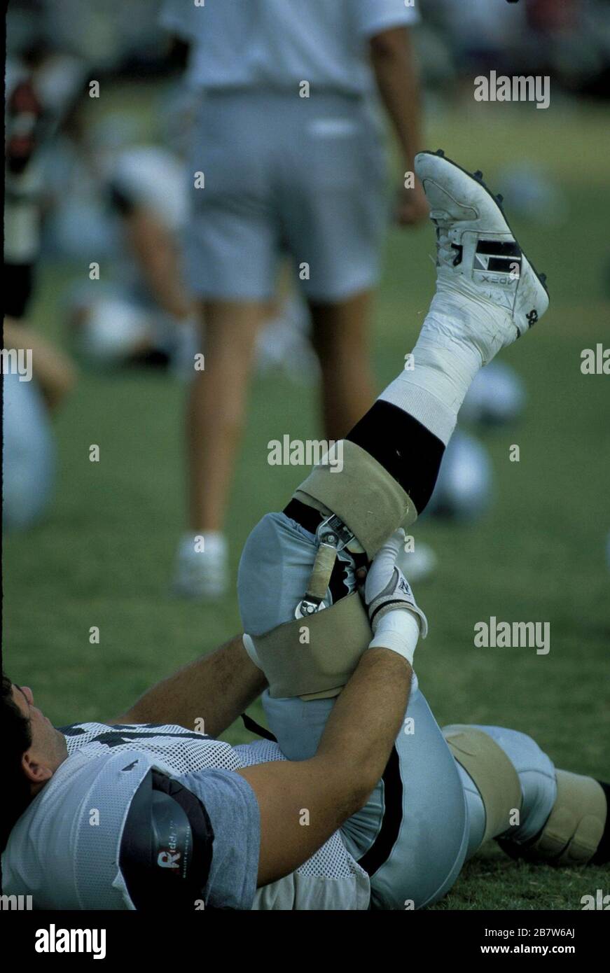 Athlete wearing knee brace hi-res stock photography and images - Alamy