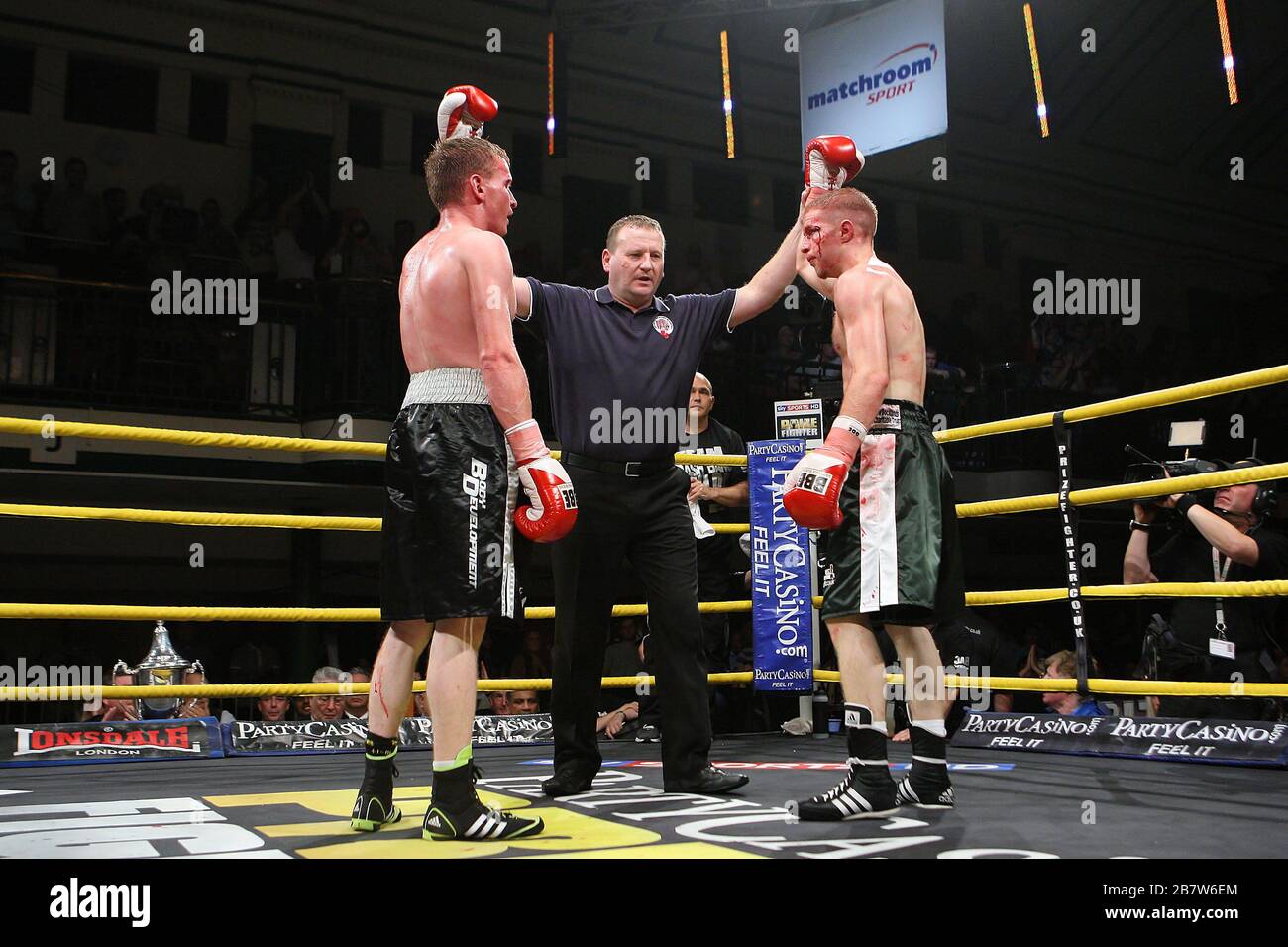Ryan Taylor (dark green shorts) draws with Dan Carr (black shorts) in a ...