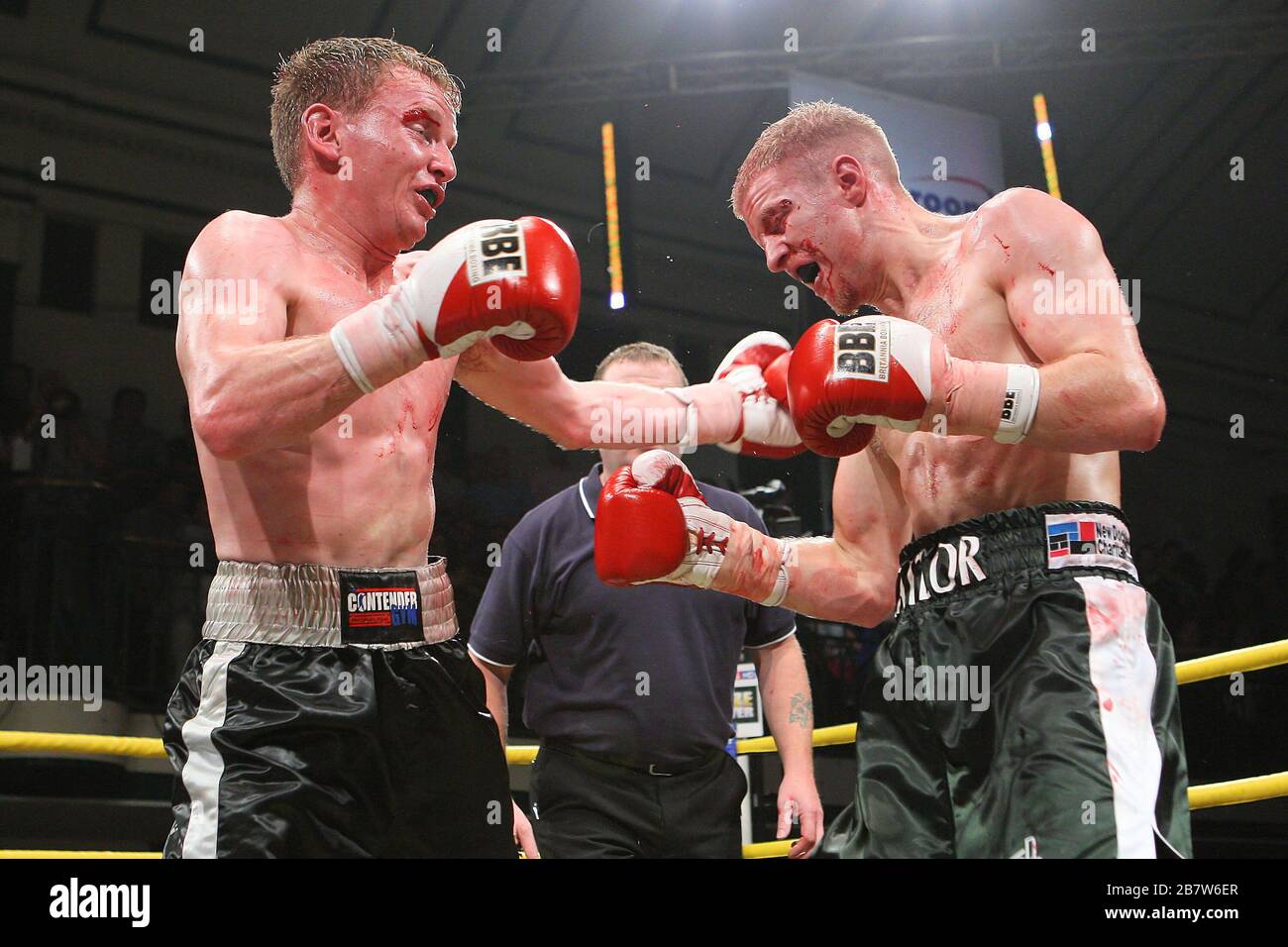 Ryan Taylor (dark green shorts) draws with Dan Carr (black shorts) in a ...