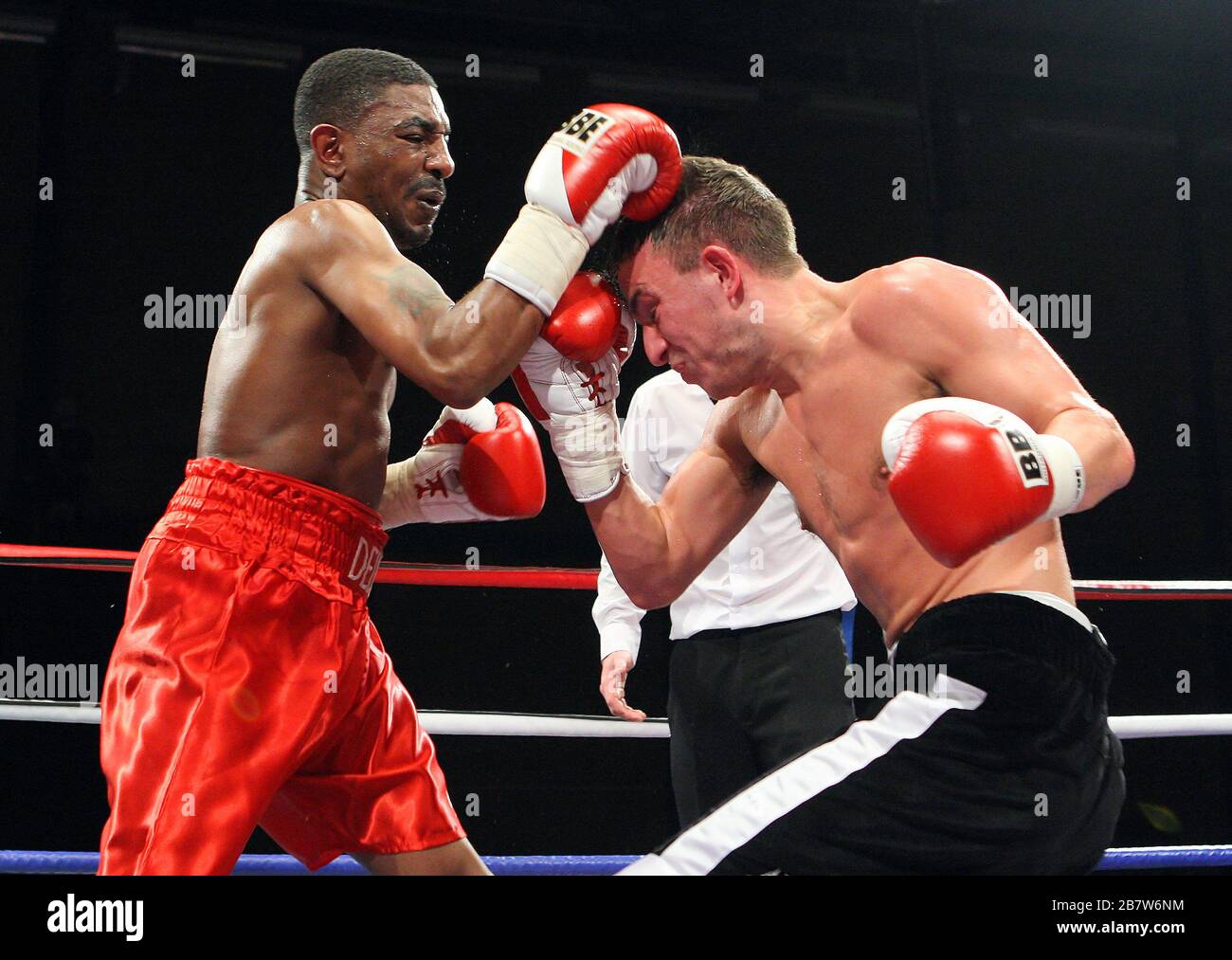Lewis Pettitt (black shorts) defeats Delroy Spencer in a Featherweight ...