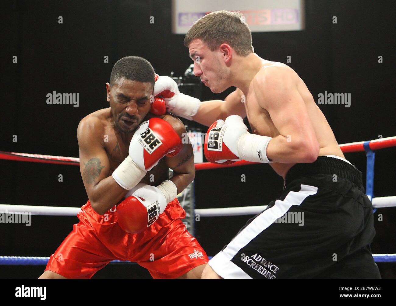 Lewis Pettitt (black shorts) defeats Delroy Spencer in a Featherweight ...