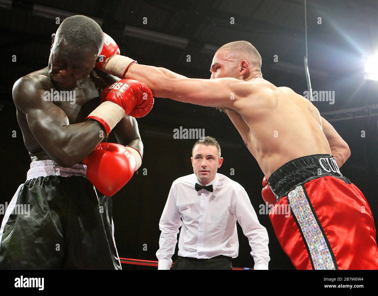 Erick Ochieng (black shorts) defeats Curtis Valentine in a Light ...