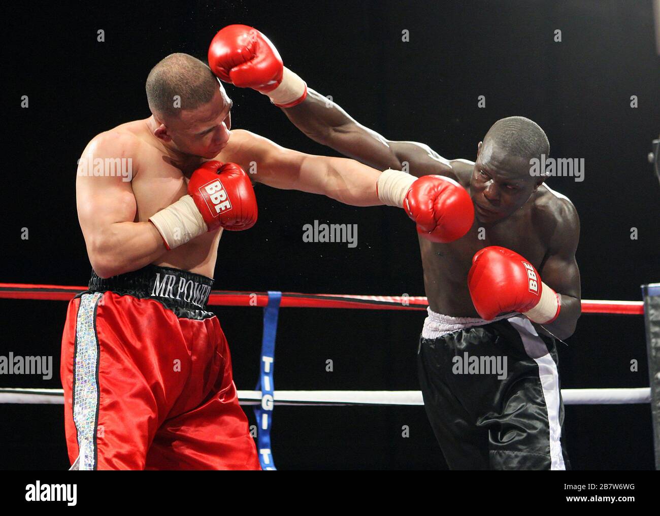 Erick Ochieng (black shorts) defeats Curtis Valentine in a Light ...