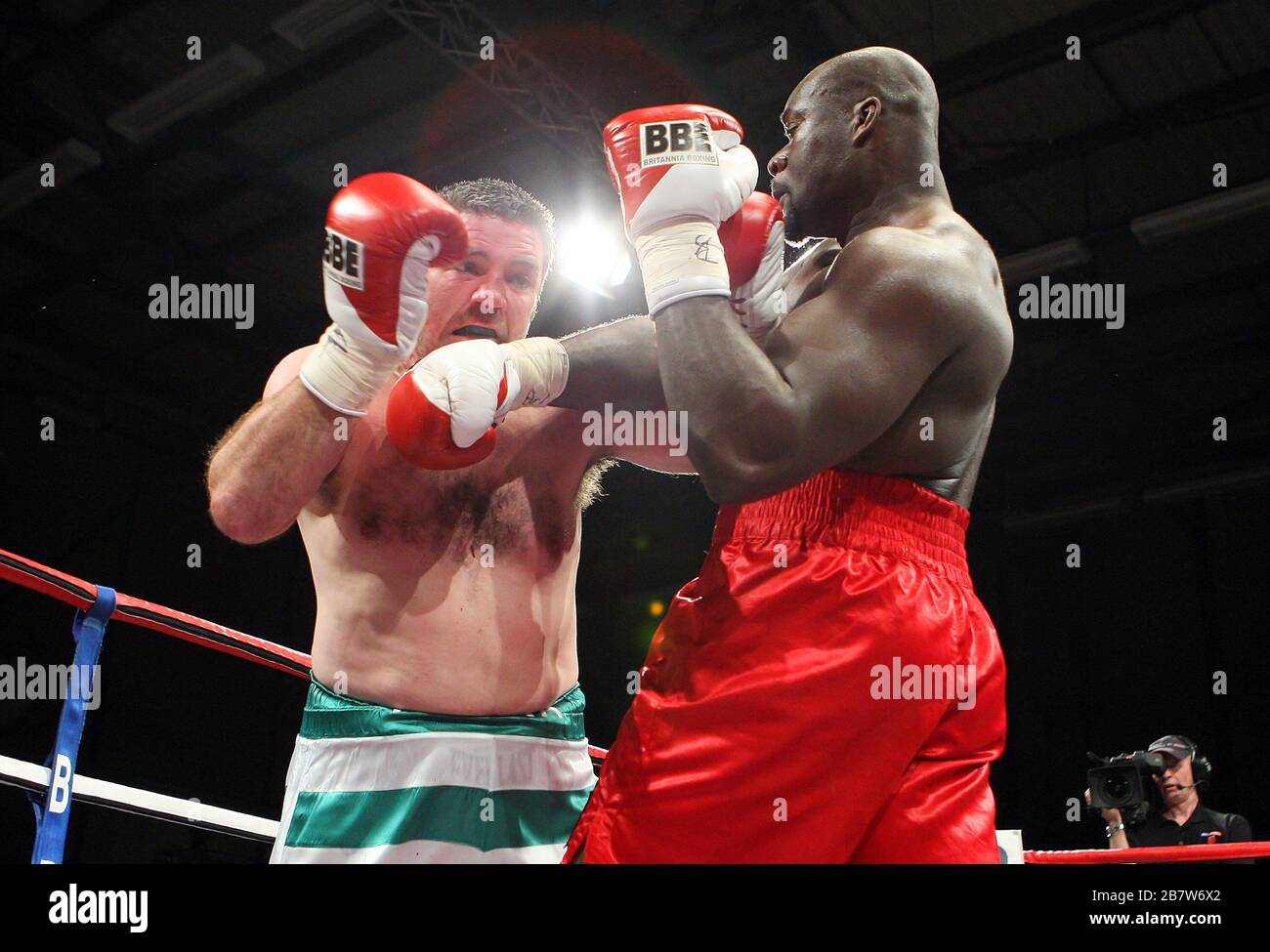 Larry Olubamiwo (red shorts) defeats Colin Kenna in a Heavyweight ...