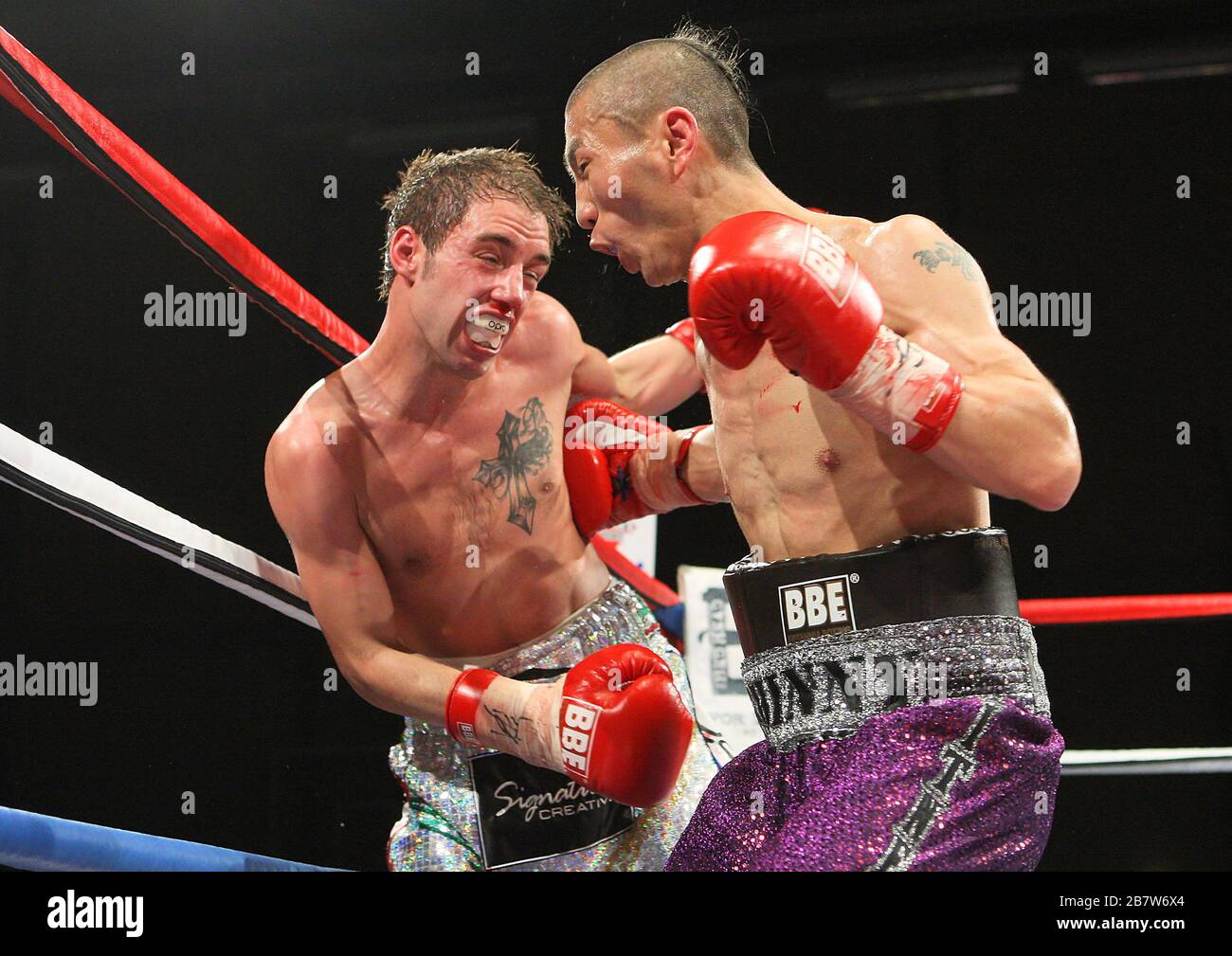 Shinny Bayaar (purple shorty) draws with Ashley Sexton in a Flyweight ...