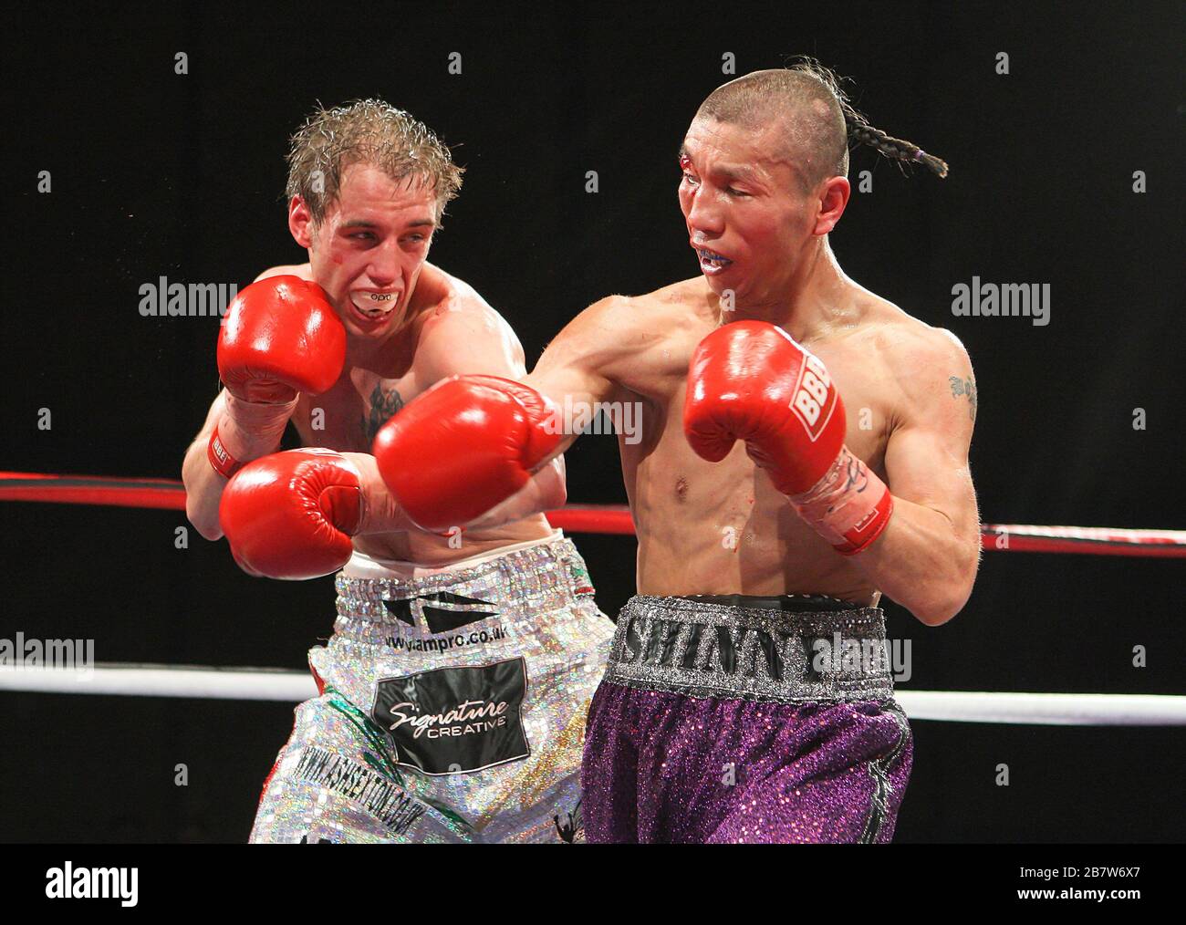 Shinny Bayaar (purple shorty) draws with Ashley Sexton in a Flyweight ...