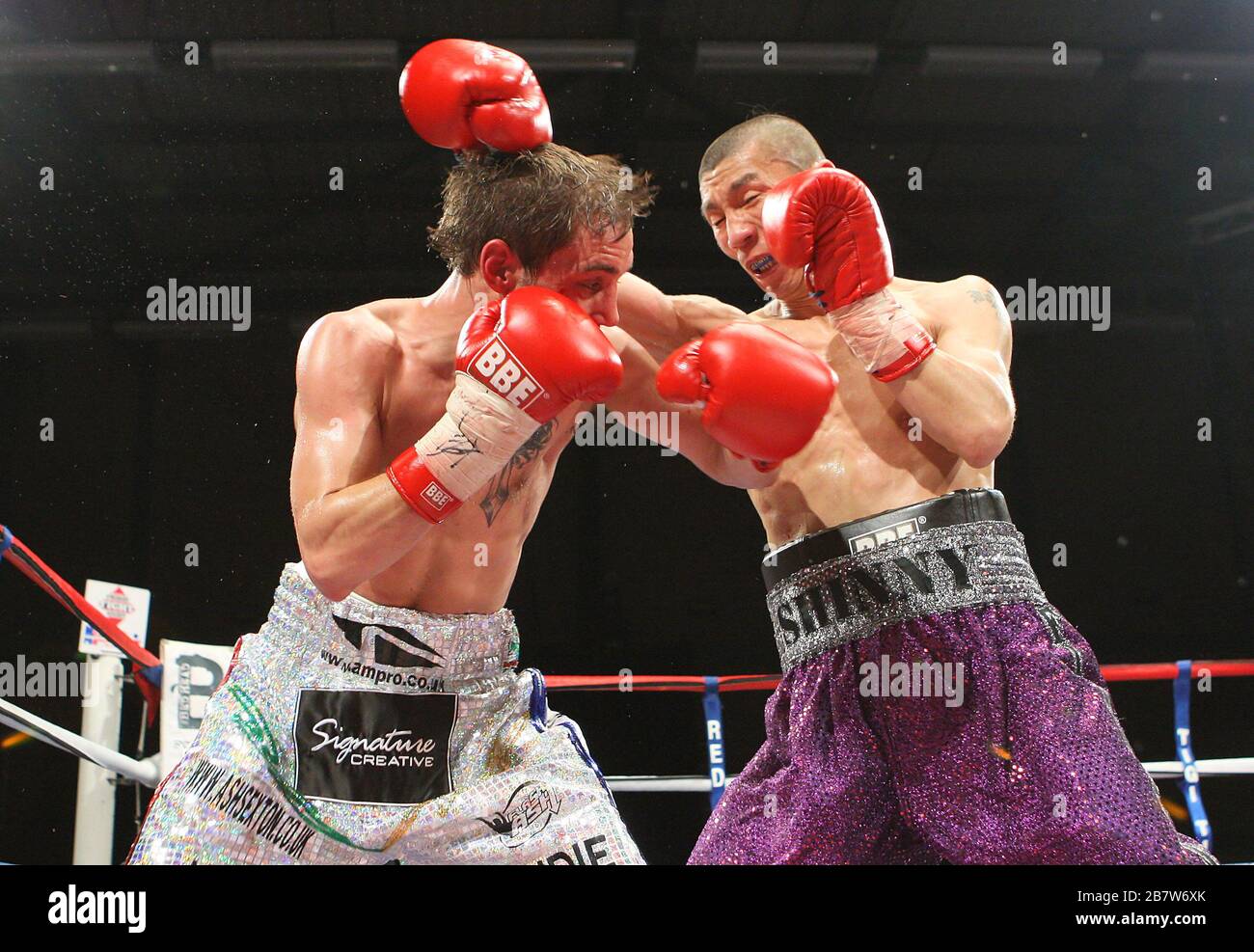 Shinny Bayaar (purple shorty) draws with Ashley Sexton in a Flyweight ...