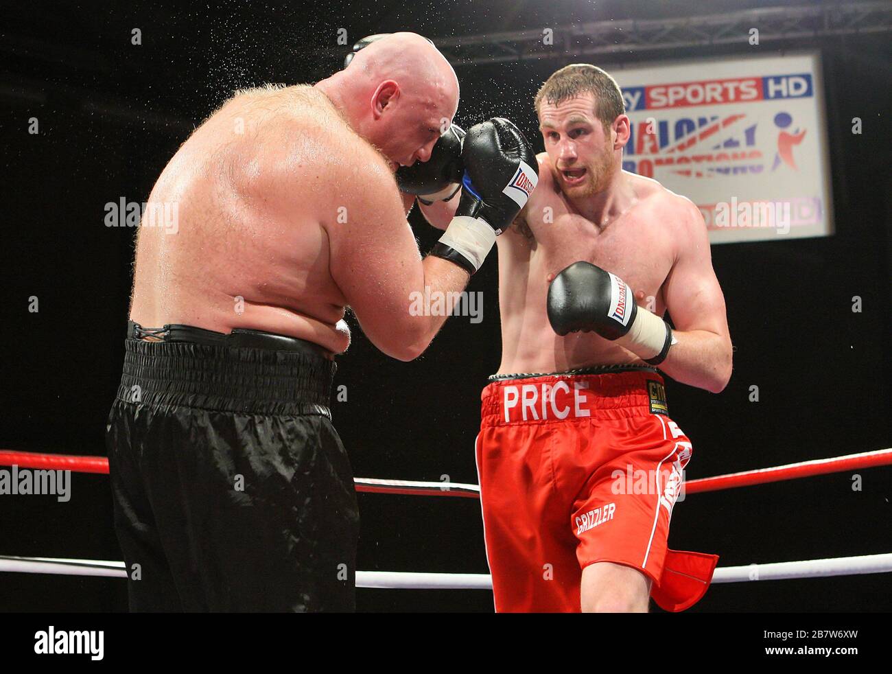 David Price (red shorts) defeats Daniil Peretyatko in a Heavyweight ...