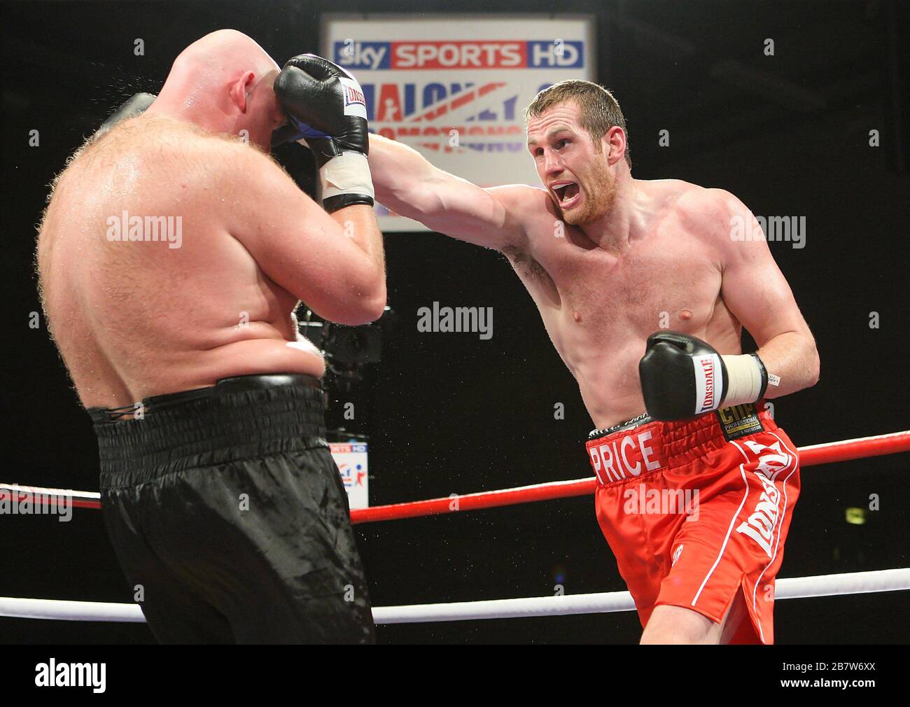 David Price (red shorts) defeats Daniil Peretyatko in a Heavyweight ...